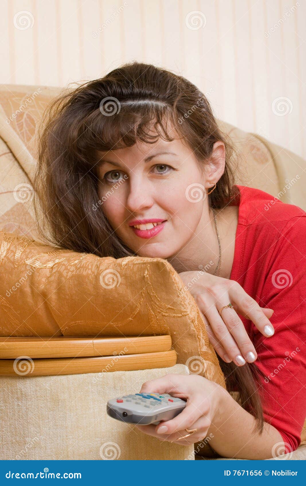 Pretty Woman with a Remote Control Stock Photo - Image of caucasian ...