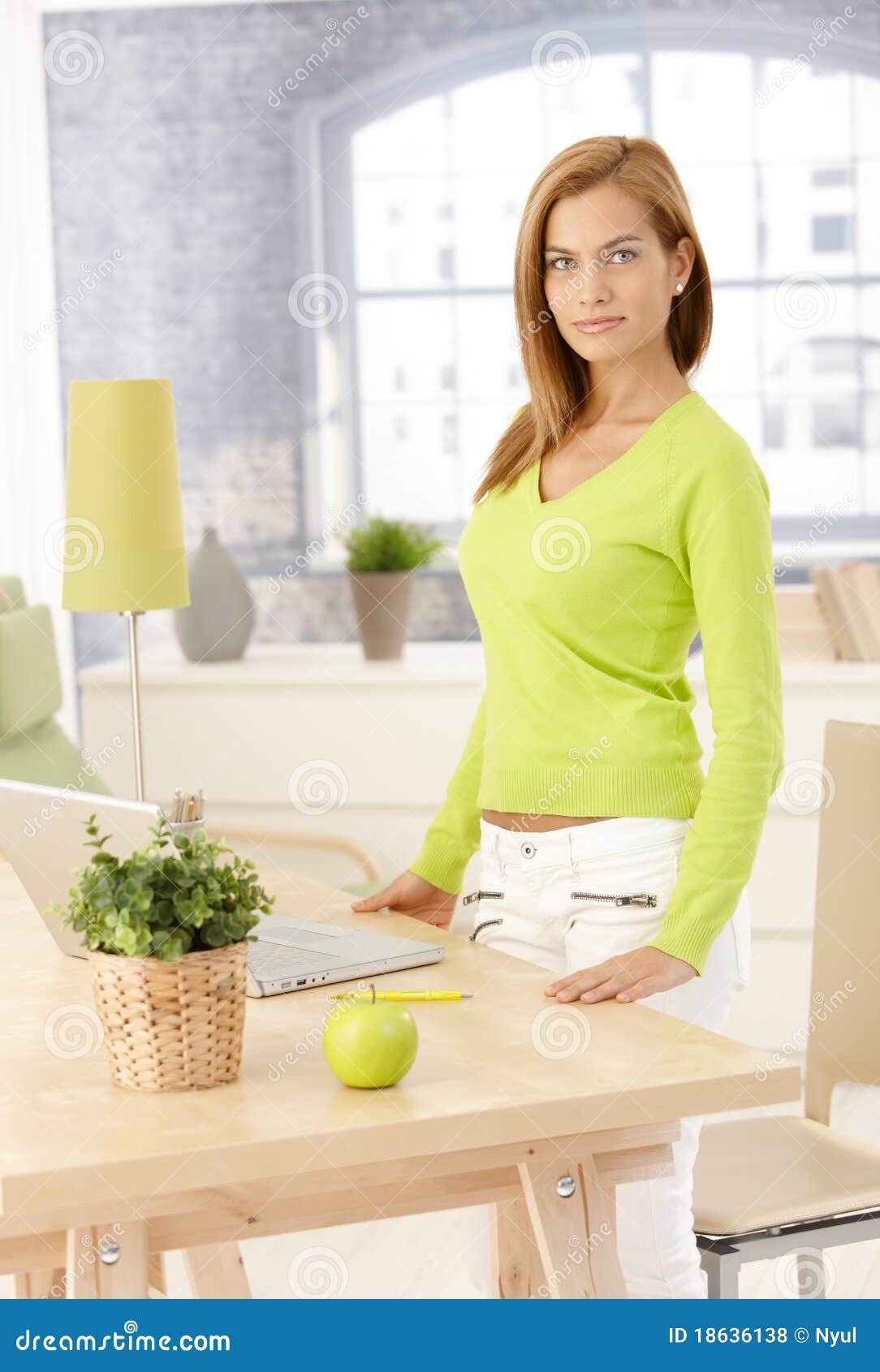 Pretty Woman Standing at Table Stock Photo - Image of green, fruit ...