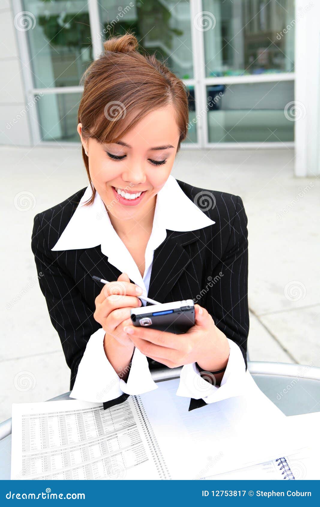 Pretty Woman Texting at Work Stock Image - Image of female, brunette ...