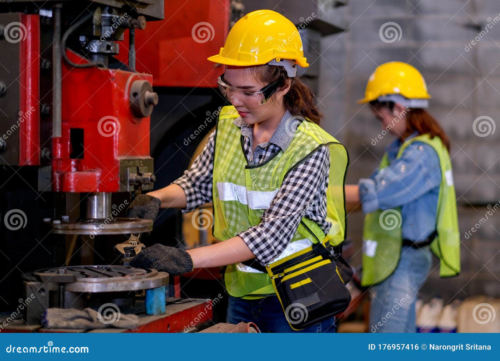 Pretty Woman Workers or Technician are Working with Machine in Factory ...