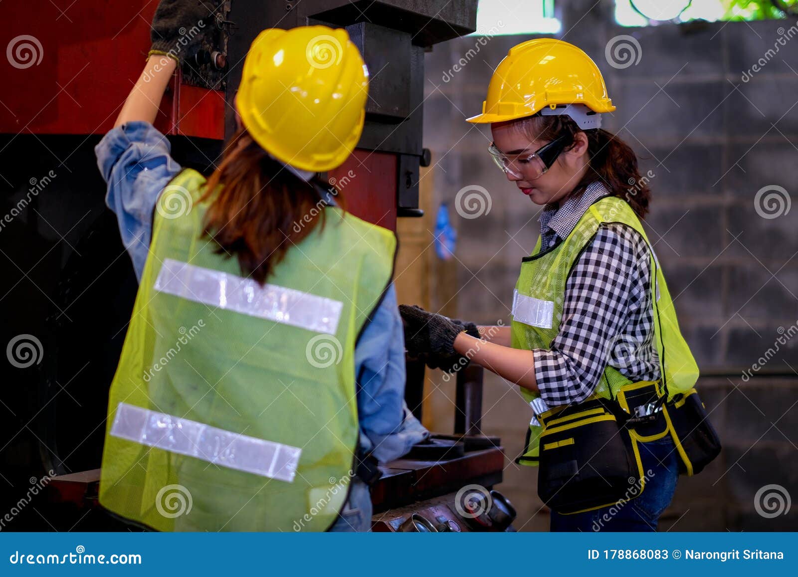 Pretty Woman Workers or Technician are Working with Machine in Factory ...