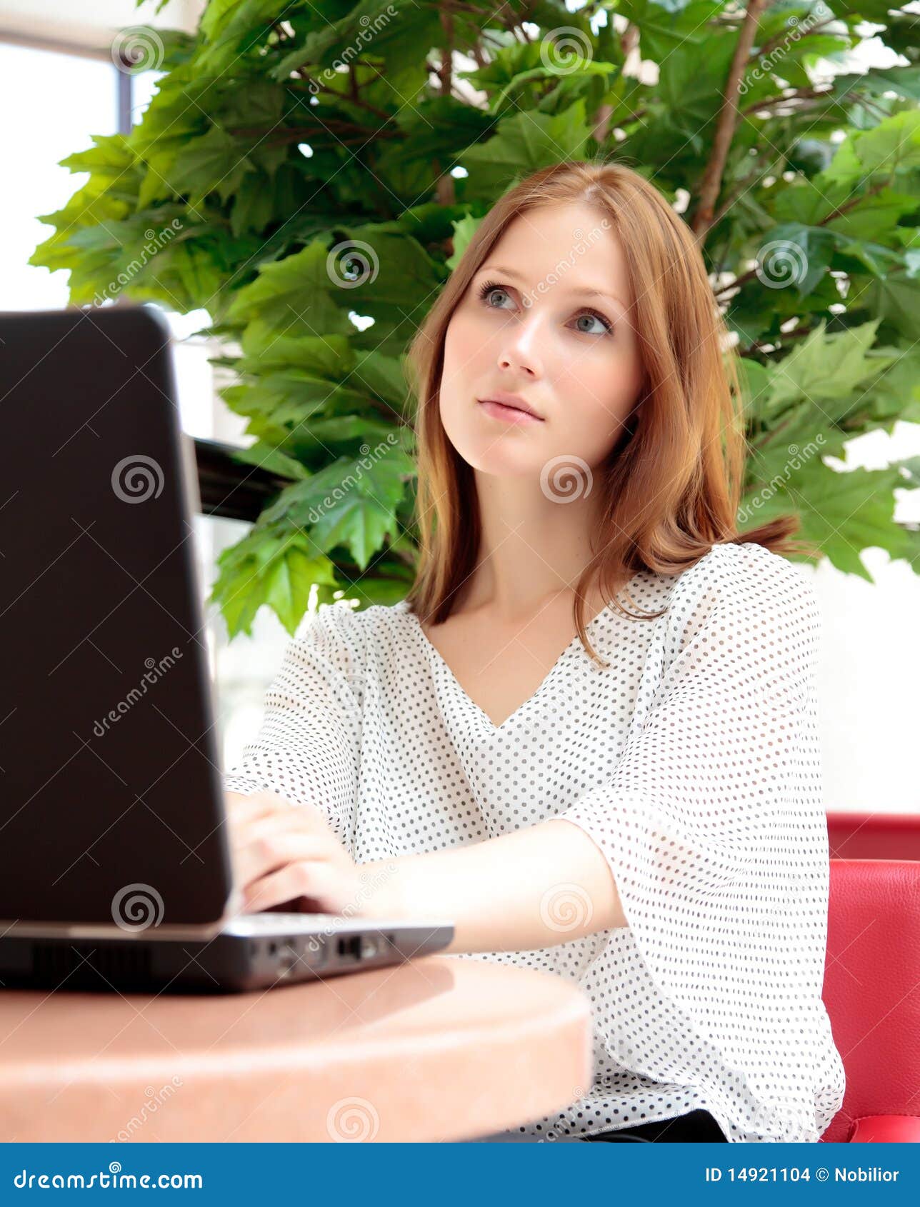 Pretty Woman Working on Her Laptop Stock Photo - Image of pensive ...