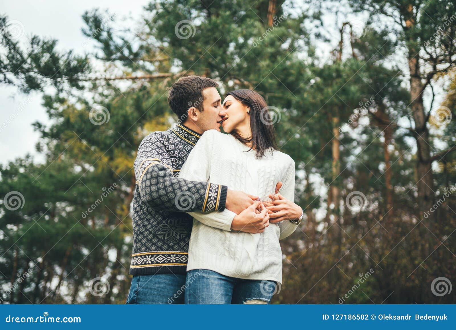 Pretty Young Couple Walking Together in the Forest. Stock Photo - Image ...