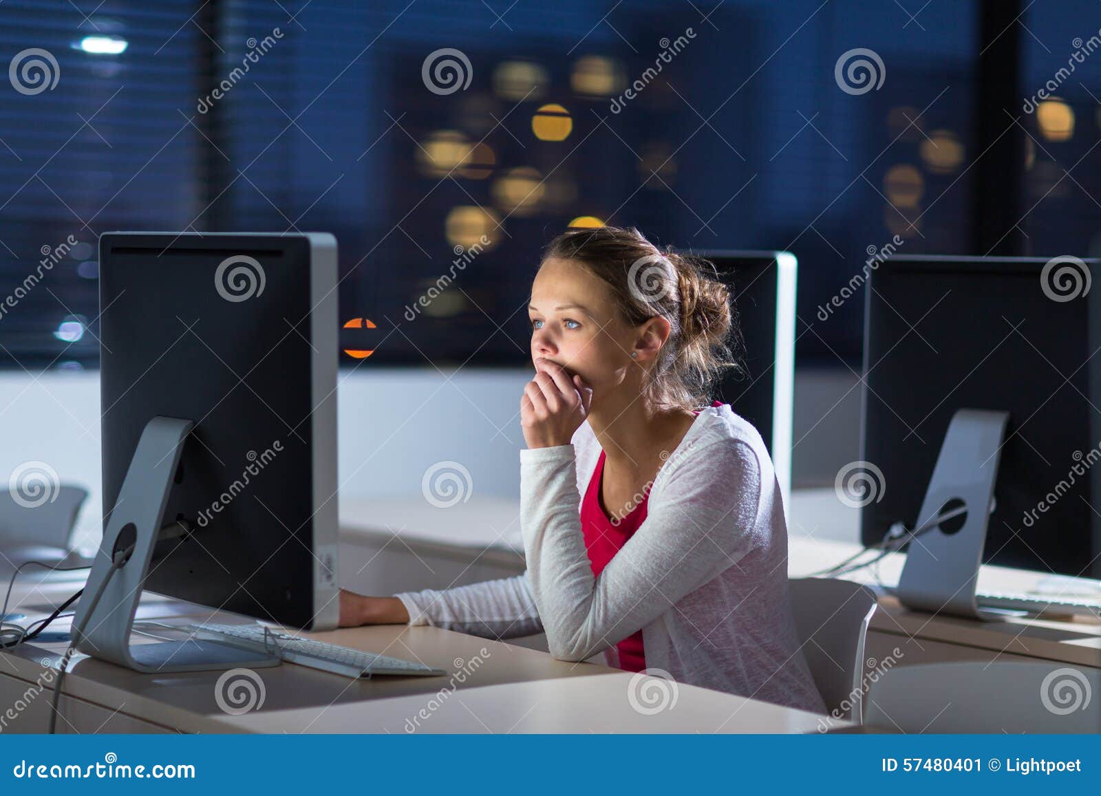 Pretty, Young Female College Student Using a Desktop Computer Stock ...
