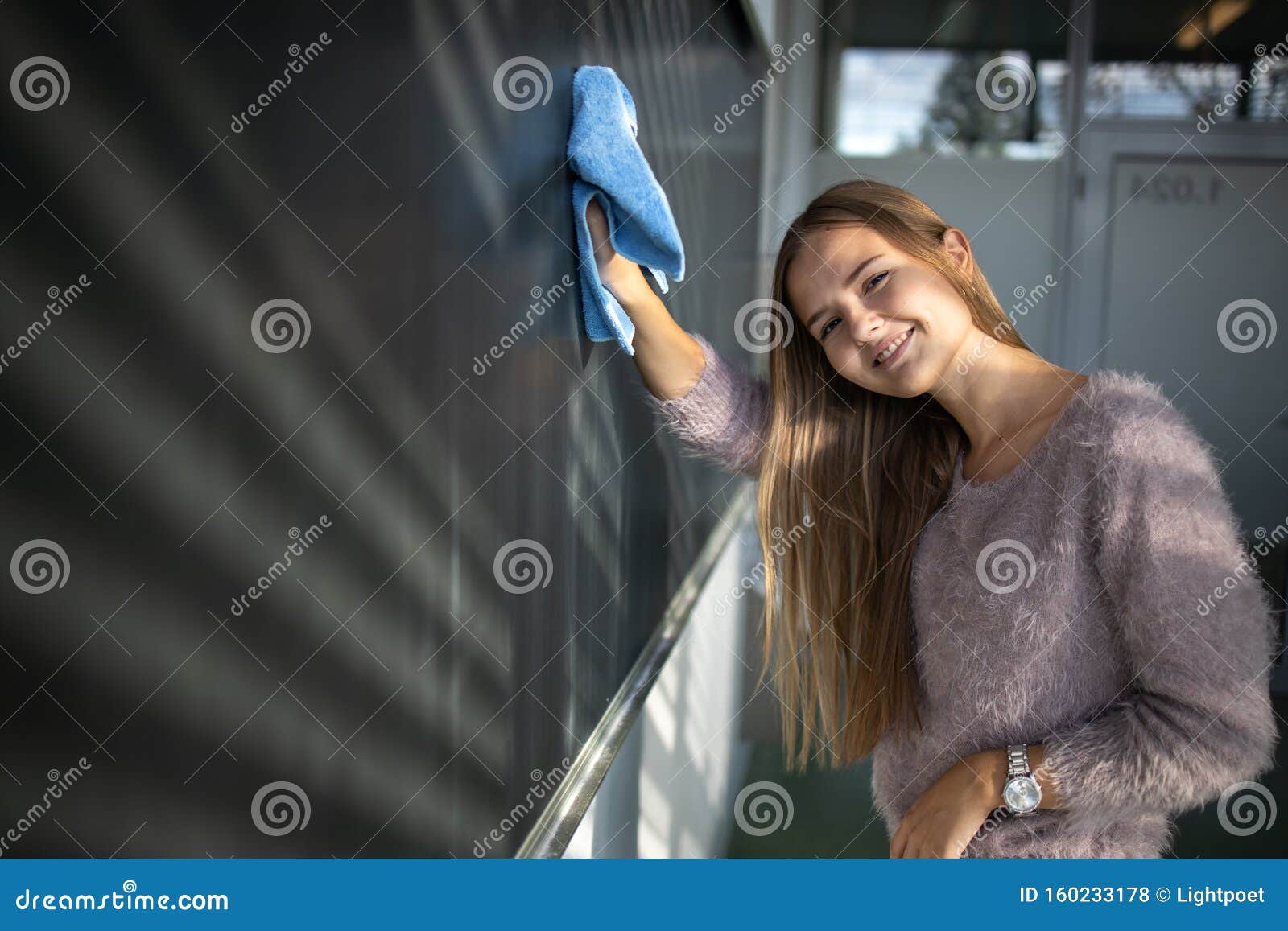 Pretty, Young Female Student in Front of a Blackboard Stock Photo ...