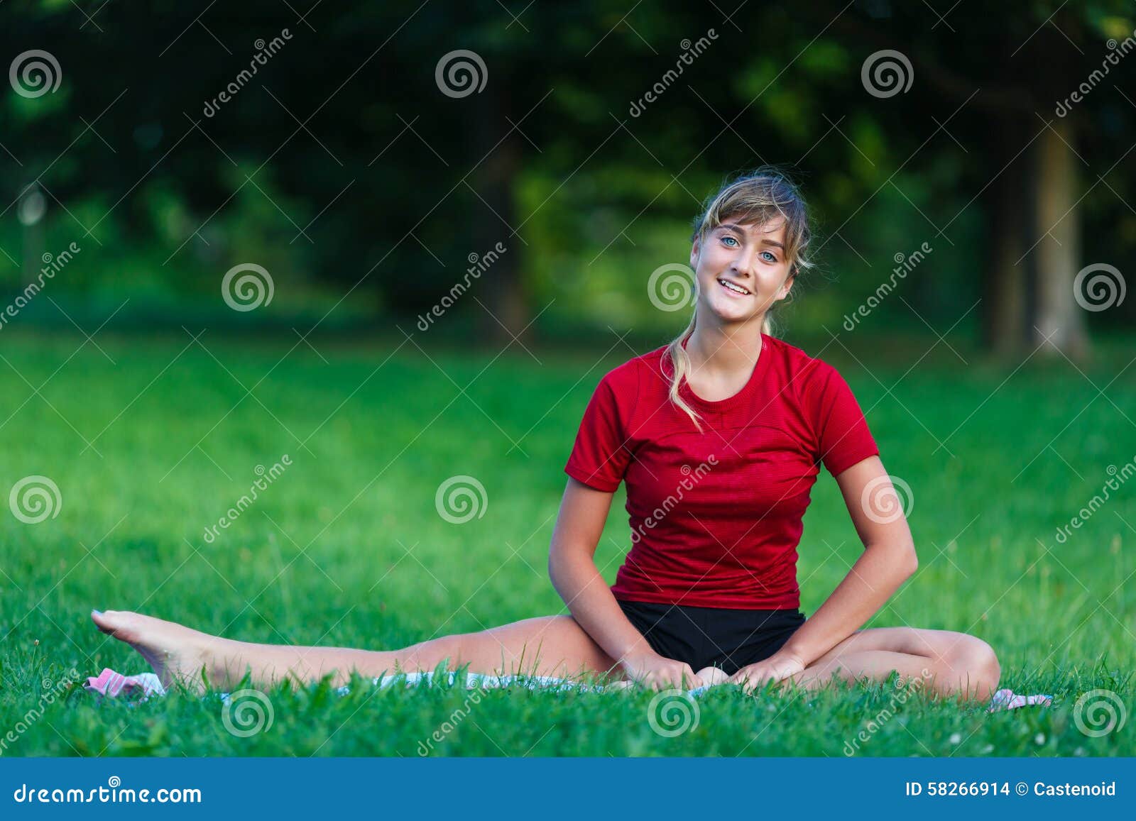 Pretty Young Girl Doing Split Exercises Stock Photo - Image of ...