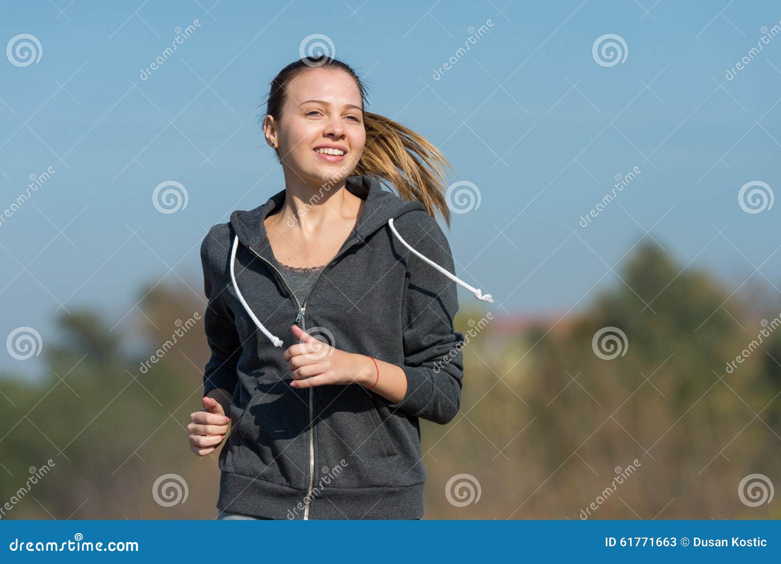 Pretty young girl jogging stock image. Image of jogging - 61771663