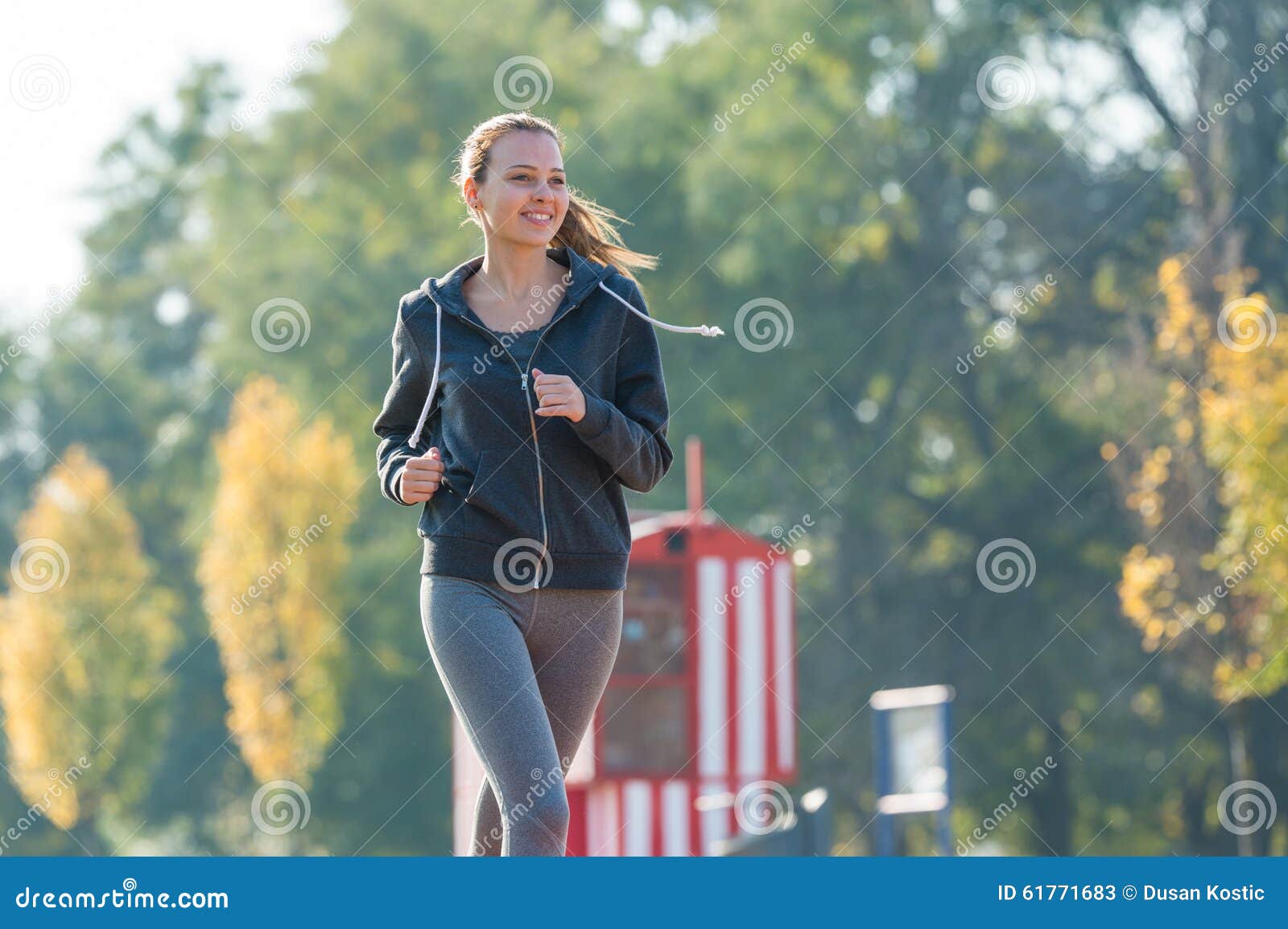 Pretty young girl jogging stock image. Image of active - 61771683