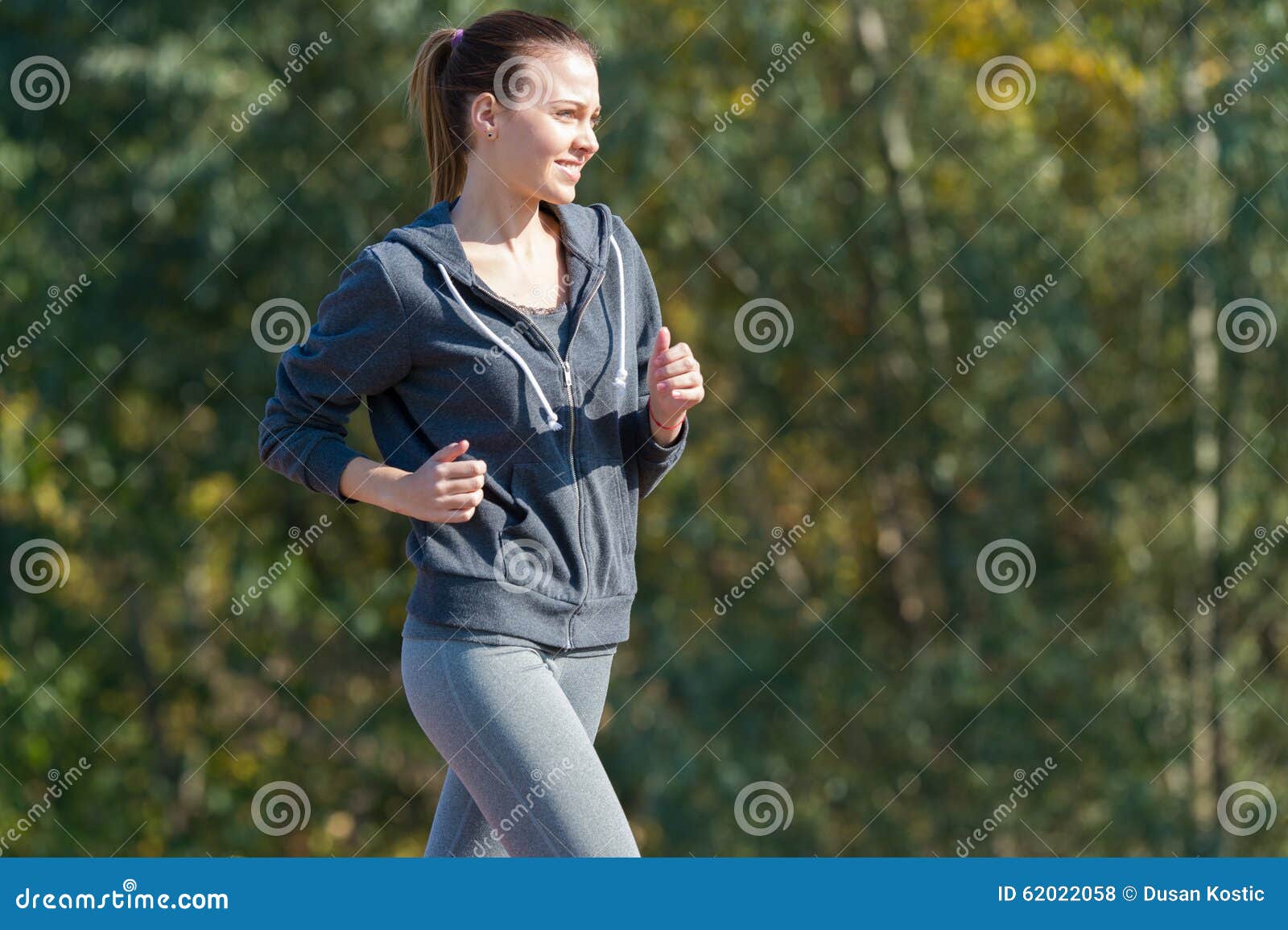 Pretty young girl jogging stock photo. Image of smiling - 62022058