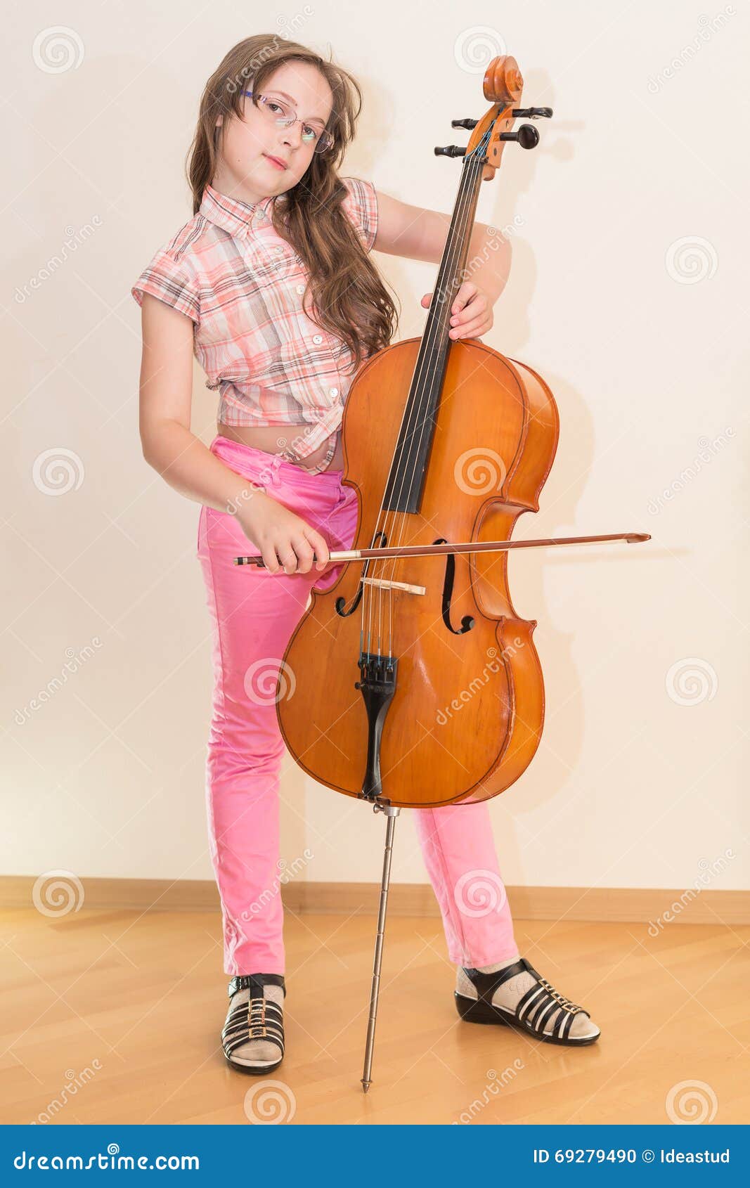 Pretty Young Girl Practice Playing Cello Stock Photo - Image of ...