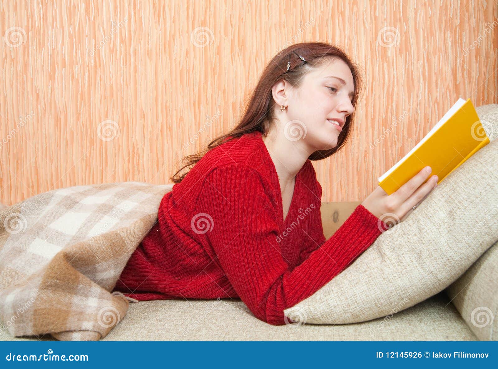 Pretty Young Girl Reading Book on Sofa Stock Photo - Image of furniture ...