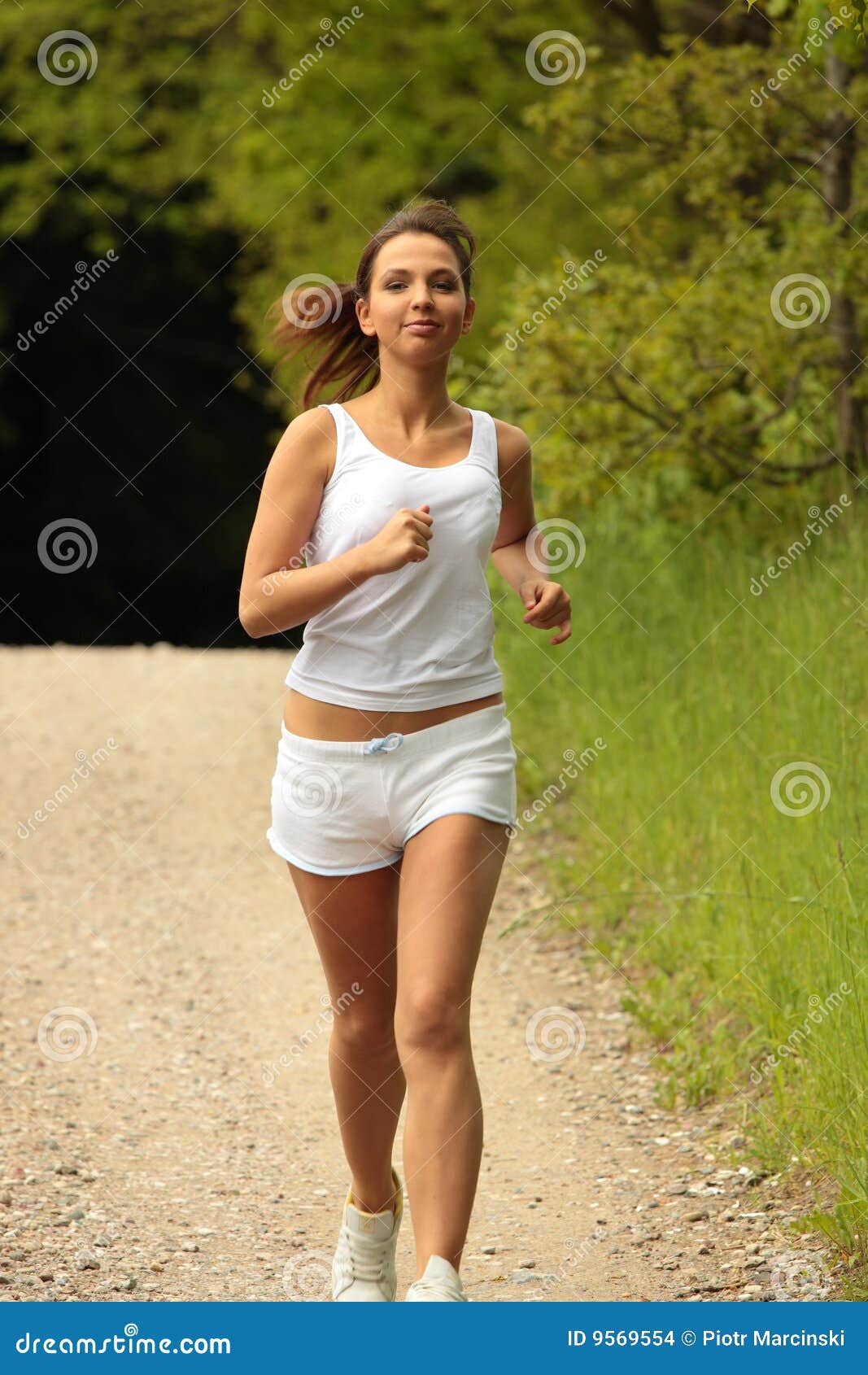 Pretty young girl runner. stock photo. Image of athlete - 9569554