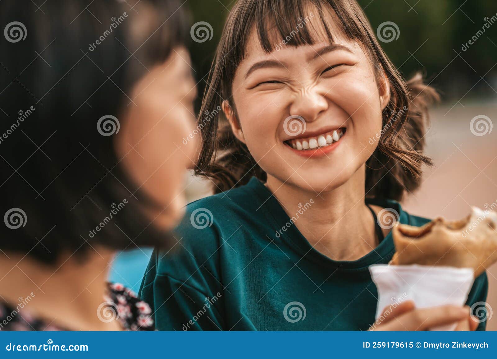 Pretty Young Girls Enjoying the Good Weather and Street Food Stock ... Pretty Young Girls Enjoying the Good Weather and Street Food Stock ...