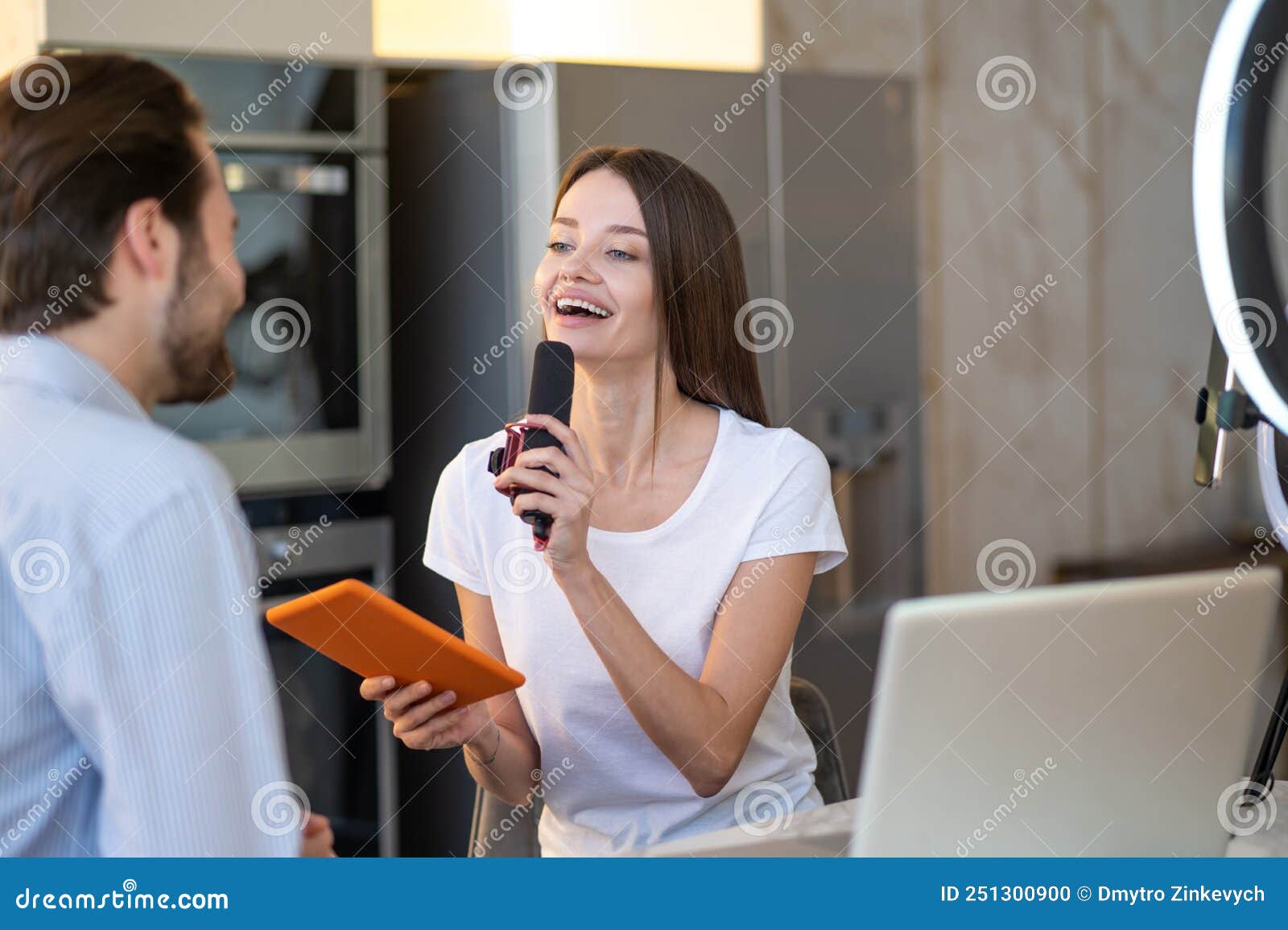Pretty Young Journalist Interviewing a Famous Person in a Studio Stock ...