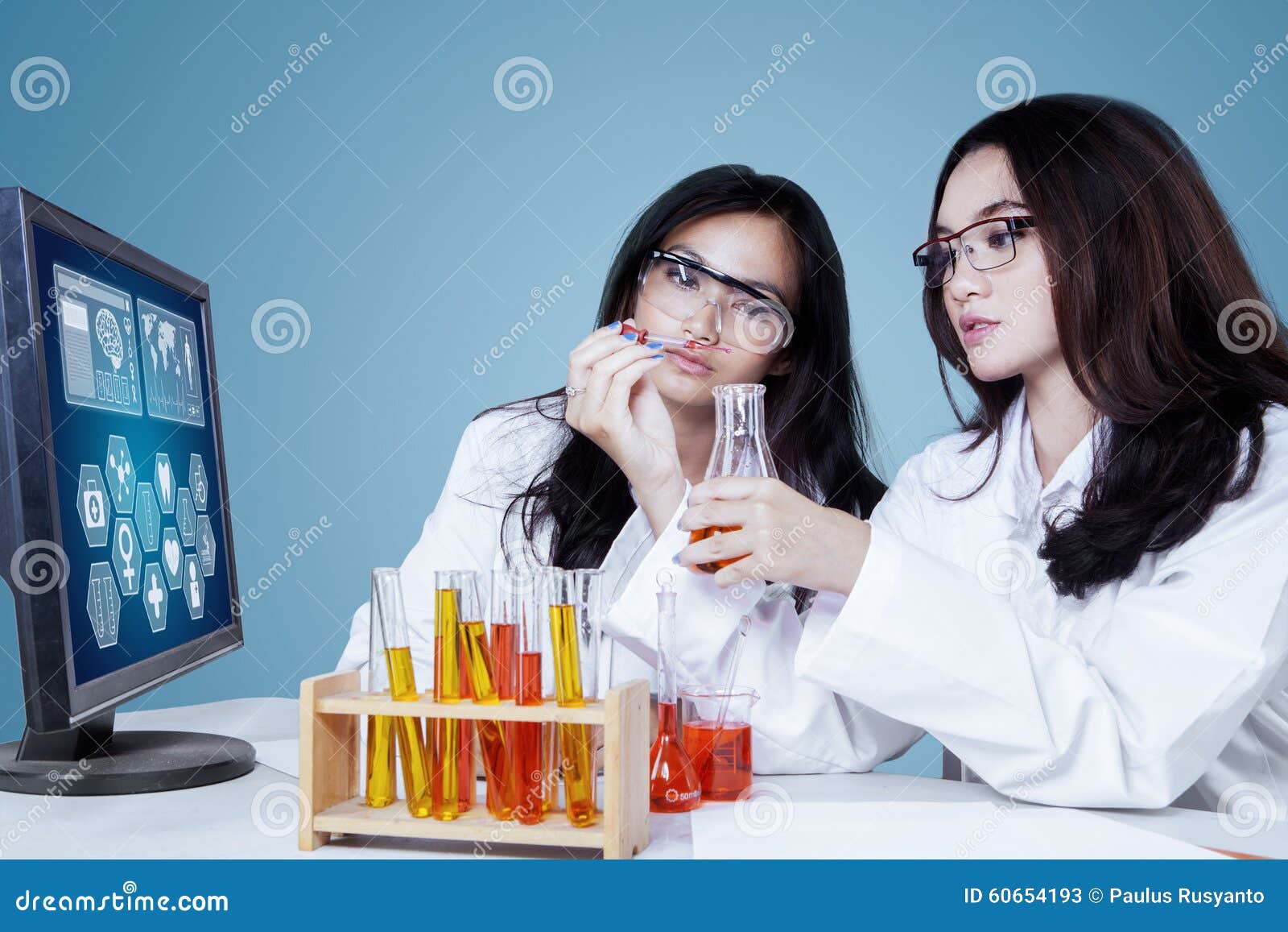 Pretty Young Scientists Working in the Lab Stock Image - Image of ...