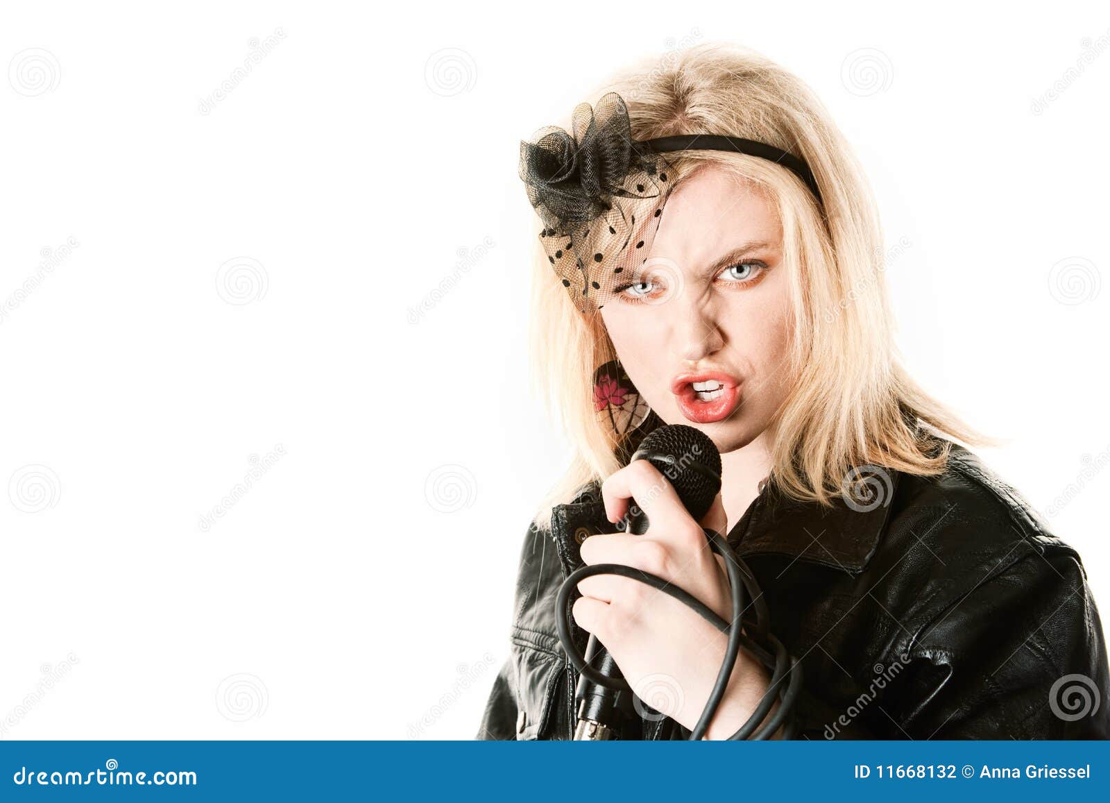 Pretty Young Singer or Comedian with Microphone Stock Photo - Image of ...