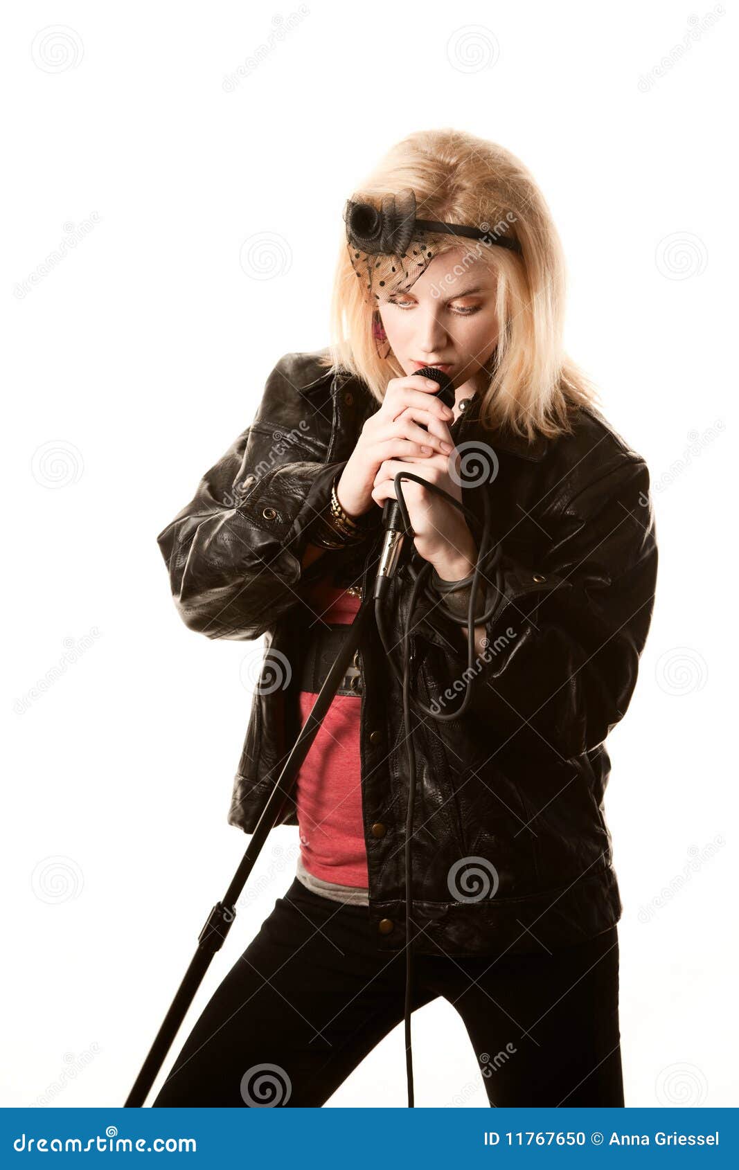Pretty Young Singer or Comedian with Microphone Stock Photo - Image of ...