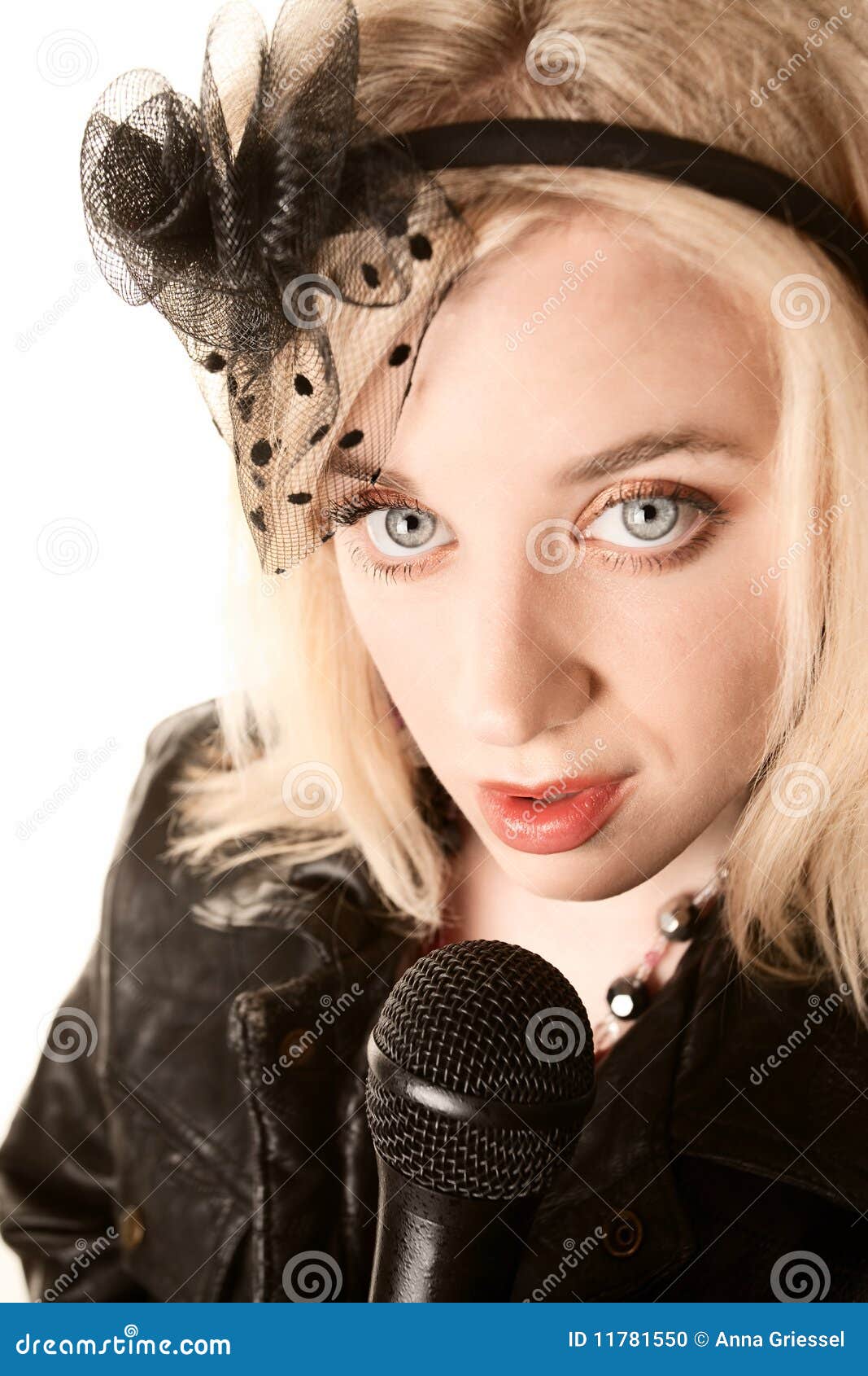 Pretty Young Singer or Comedian with Microphone Stock Photo - Image of ...