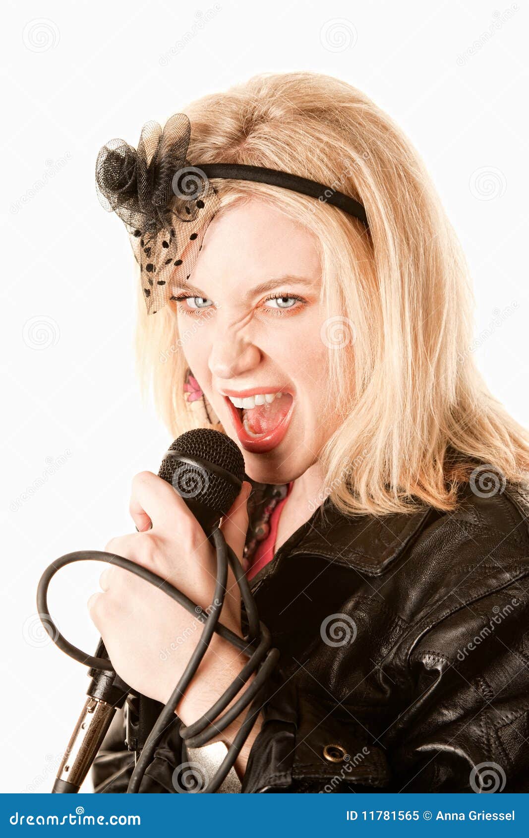 Pretty Young Singer or Comedian with Microphone Stock Image - Image of ...
