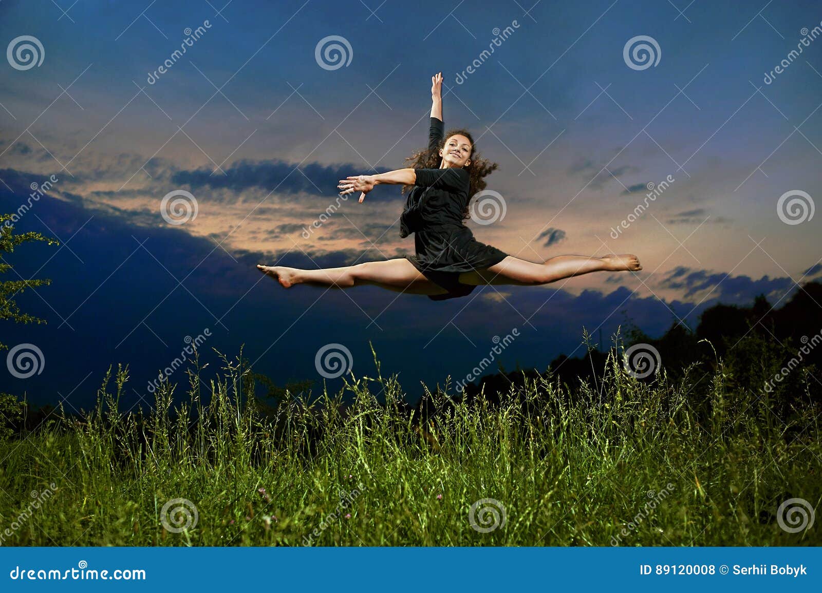Pretty, Young, Smiling Dancer Performs Splits in the Air Stock Photo ...