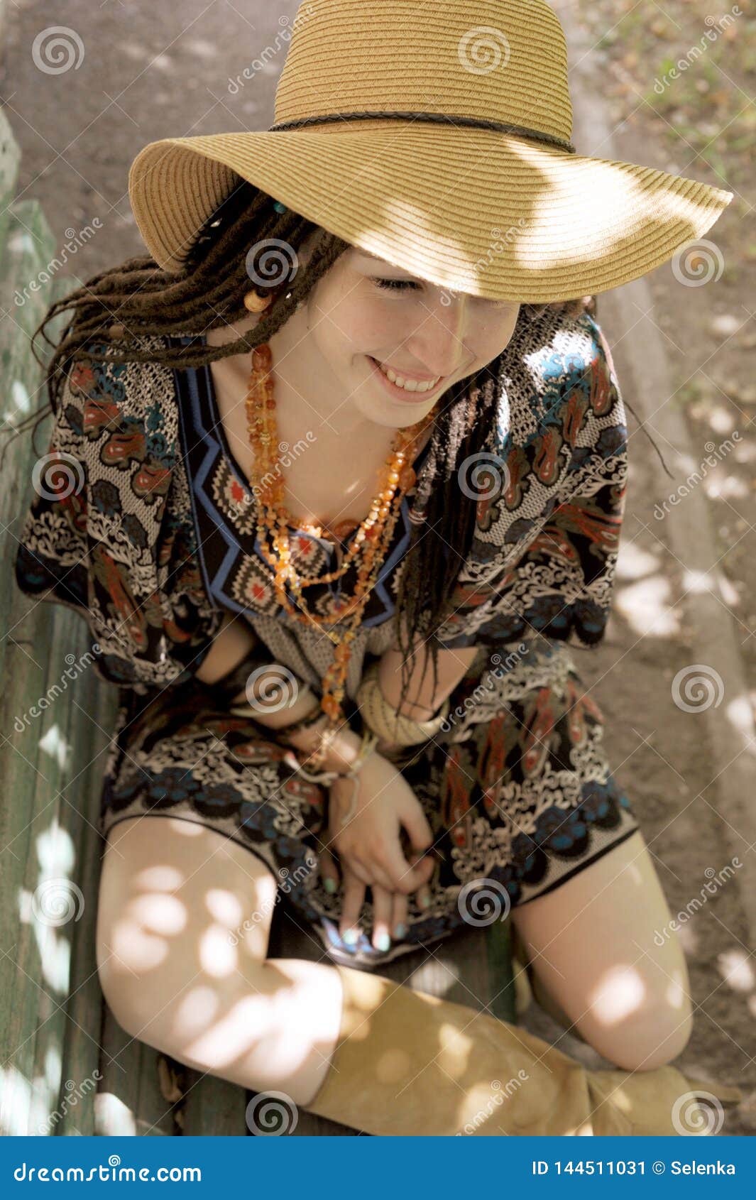 Pretty Young Woman With Dreadlocks Dressed In Indie Boho Style Stock