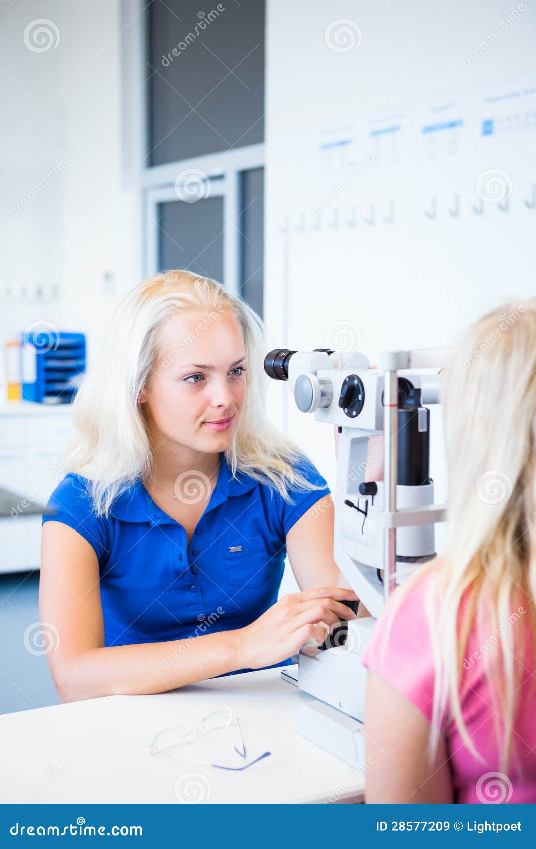 Pretty Young Woman Having Her Eyes Examined Stock Image - Image of ...