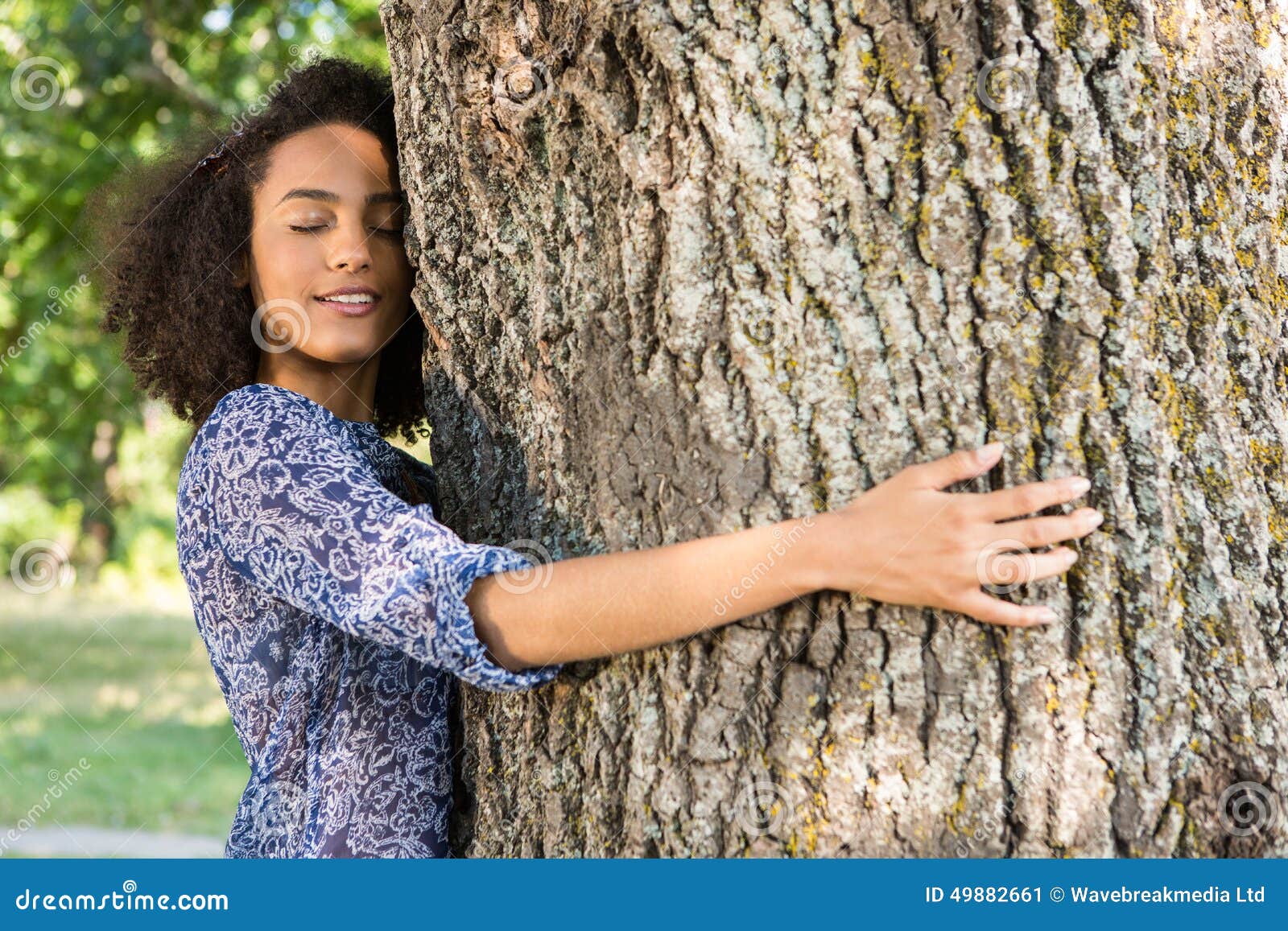 Pretty Young Woman Hugging a Tree Stock Image - Image of mixedrace ...