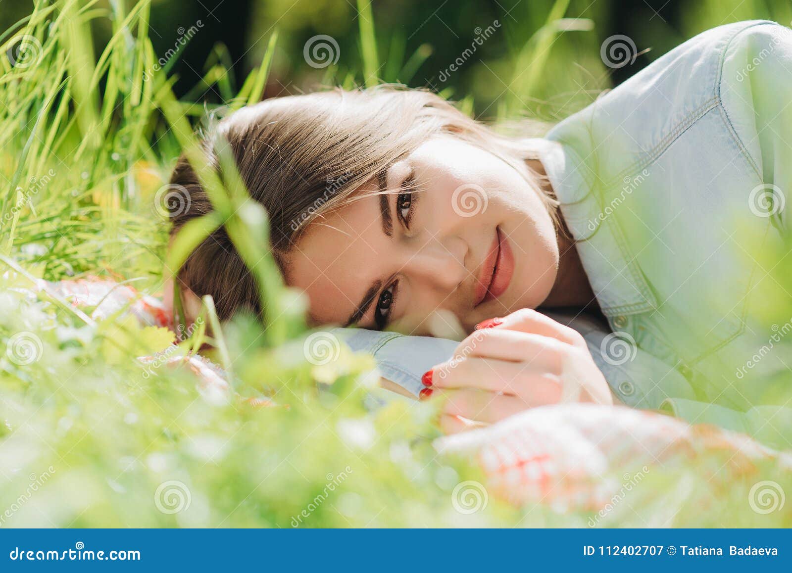 Woman laying in grass stock image. Image of model, girl - 112402707