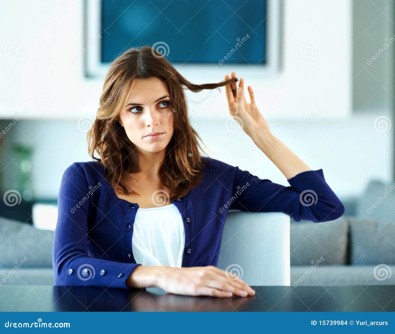 Pretty Young Woman Looking Bored - Indoor Stock Photo - Image of light ...