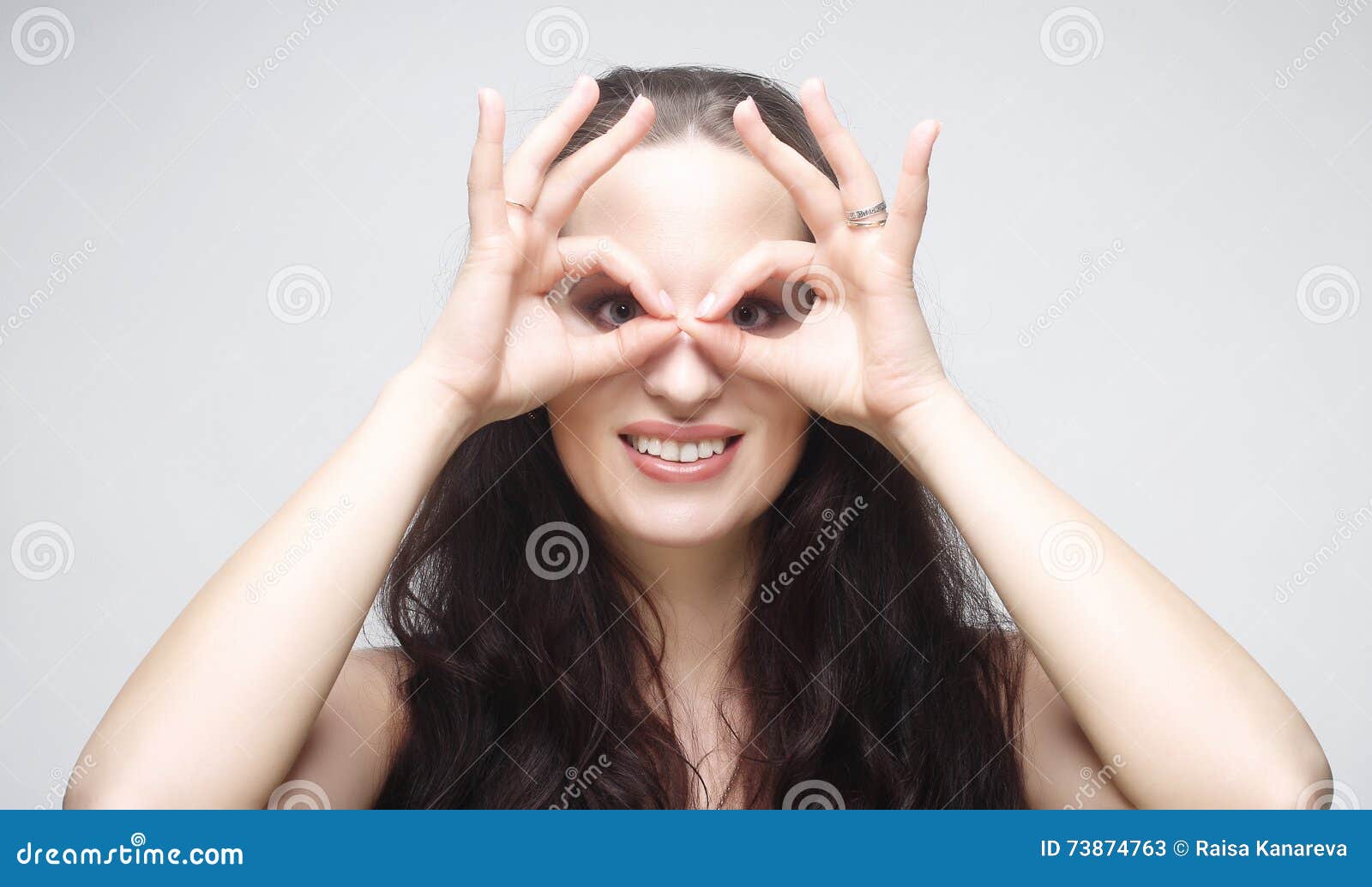 Pretty Young Woman Looking for Something with Wide Open Eyes and Stock ...