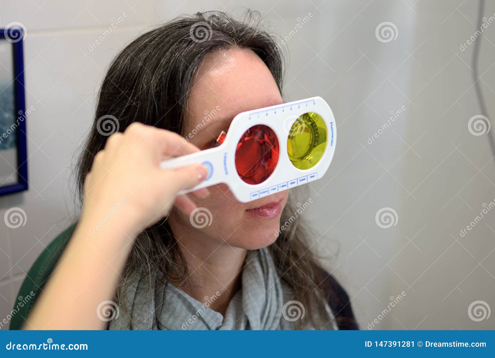Pretty Young Woman Optometrist Ophthalmologist Optician Performs a ... Pretty Young Woman Optometrist Ophthalmologist Optician Performs a ...