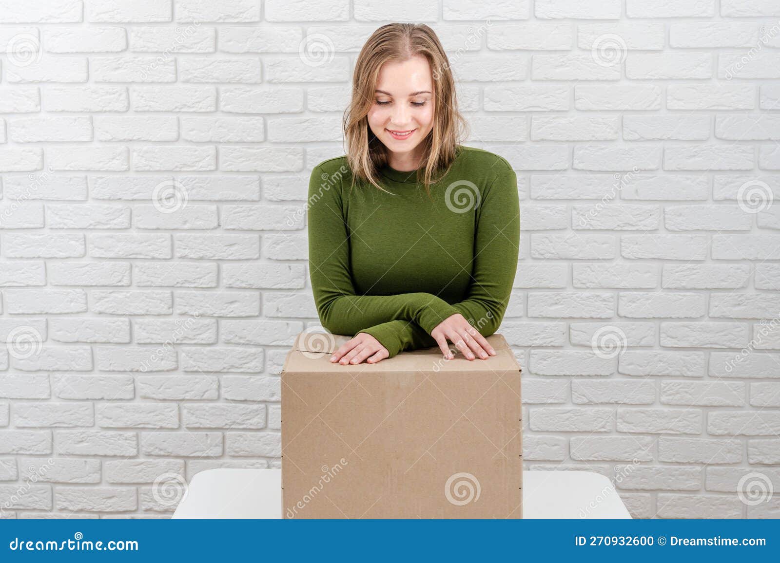 Pretty Young Woman with Parcel Box. Delivering a Parcel Stock Photo ...