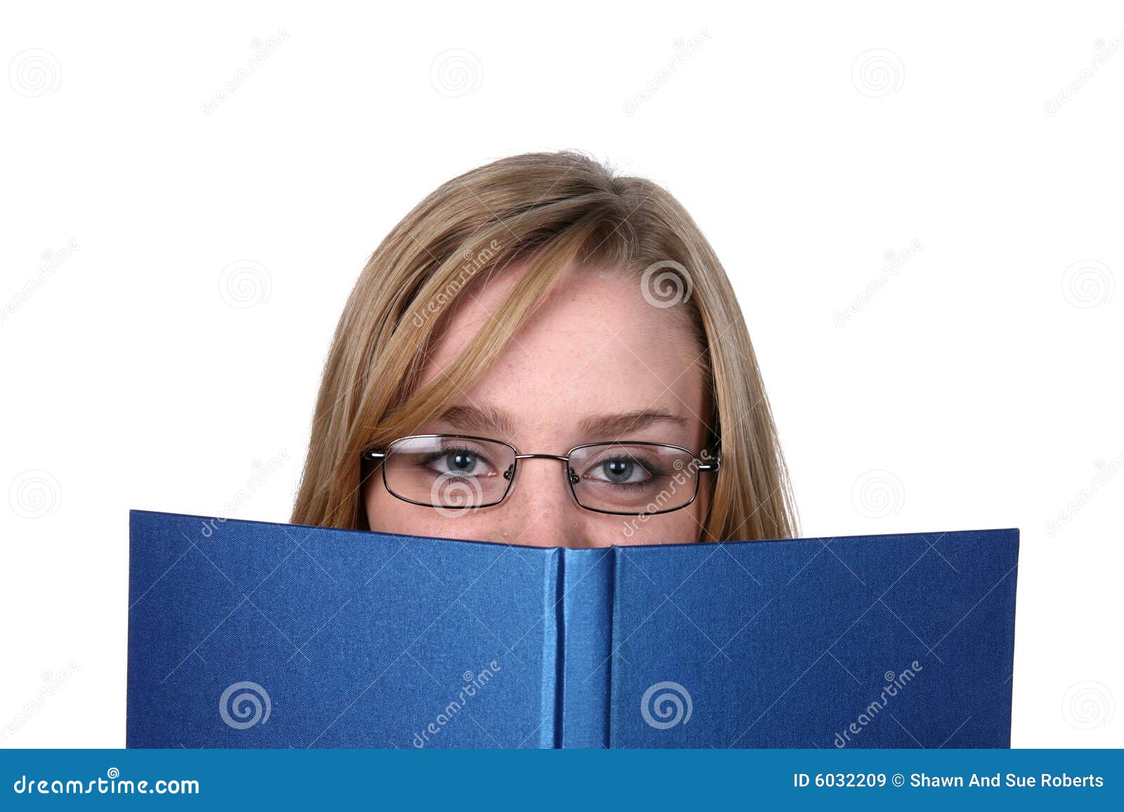 Pretty Young Woman Peeking Over Top of Book Stock Image - Image of ...