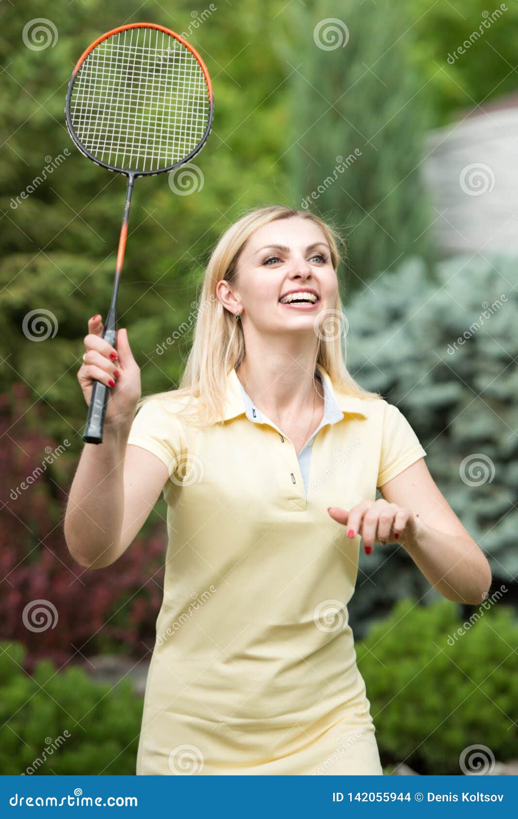 Pretty, Young Woman Playing Badminton. Stock Photo - Image of lifestyle ...