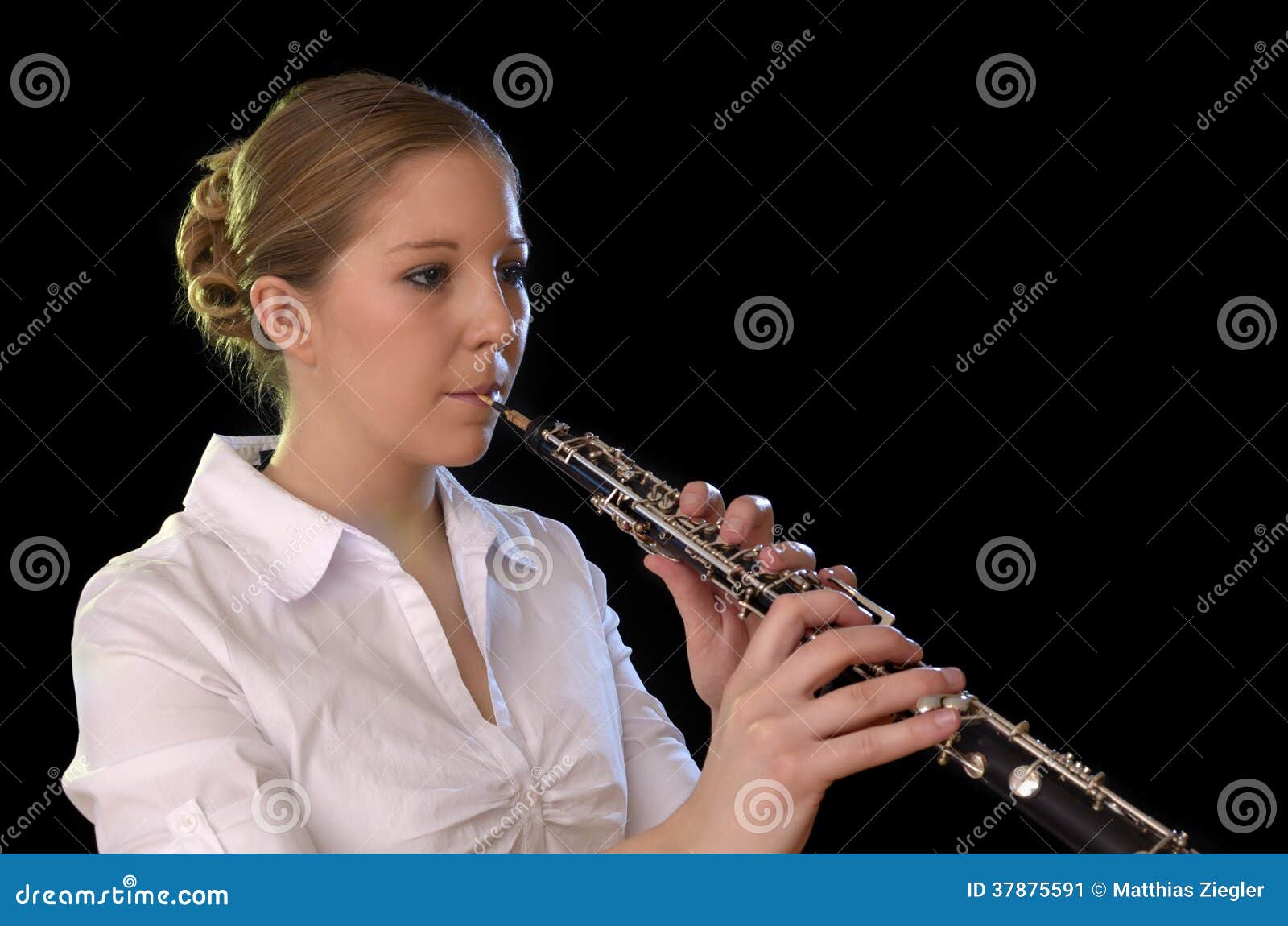Pretty Young Woman Playing Oboe Stock Image - Image of education ...