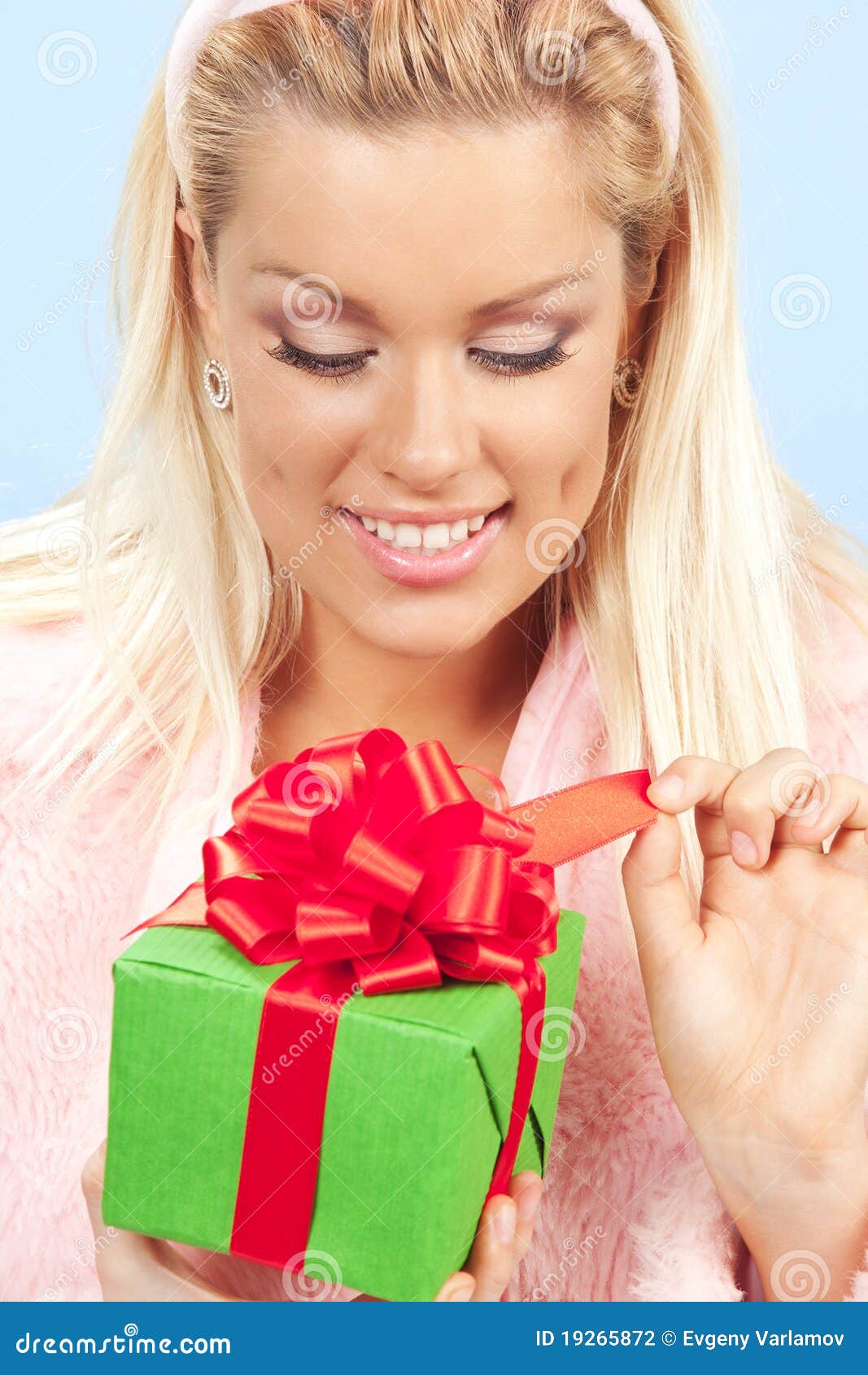 Pretty Young Woman with Present Stock Photo - Image of blond, friendly ...