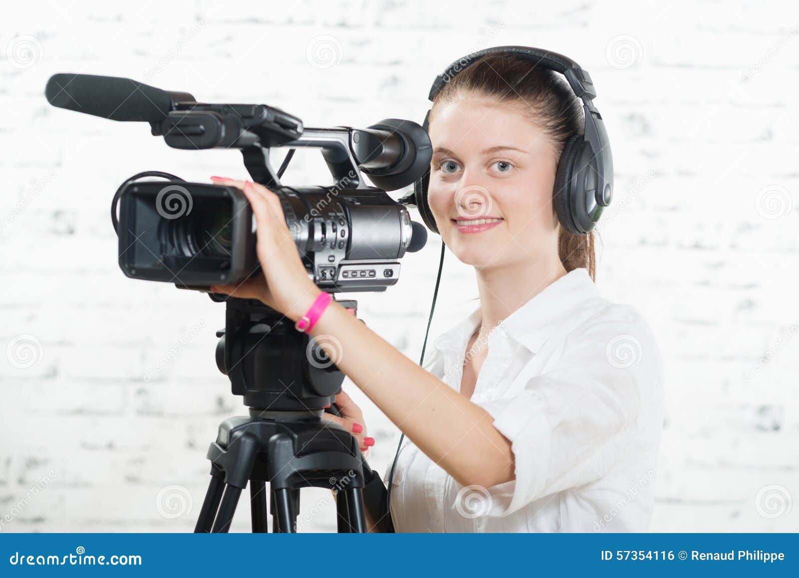 A Pretty Young Woman with a Professional Camera Stock Photo - Image of ...