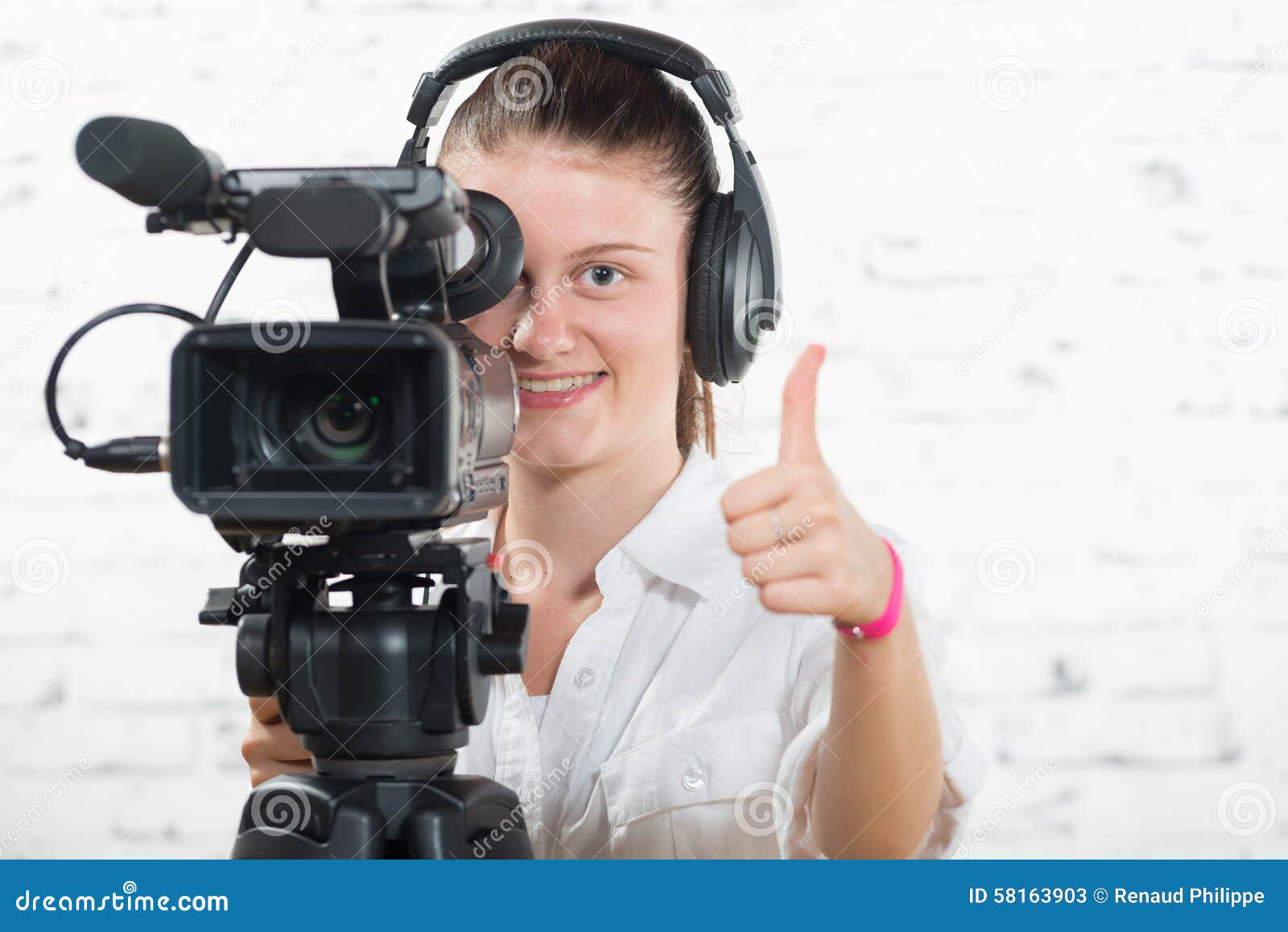 A Pretty Young Woman with a Professional Camera Stock Image - Image of ...