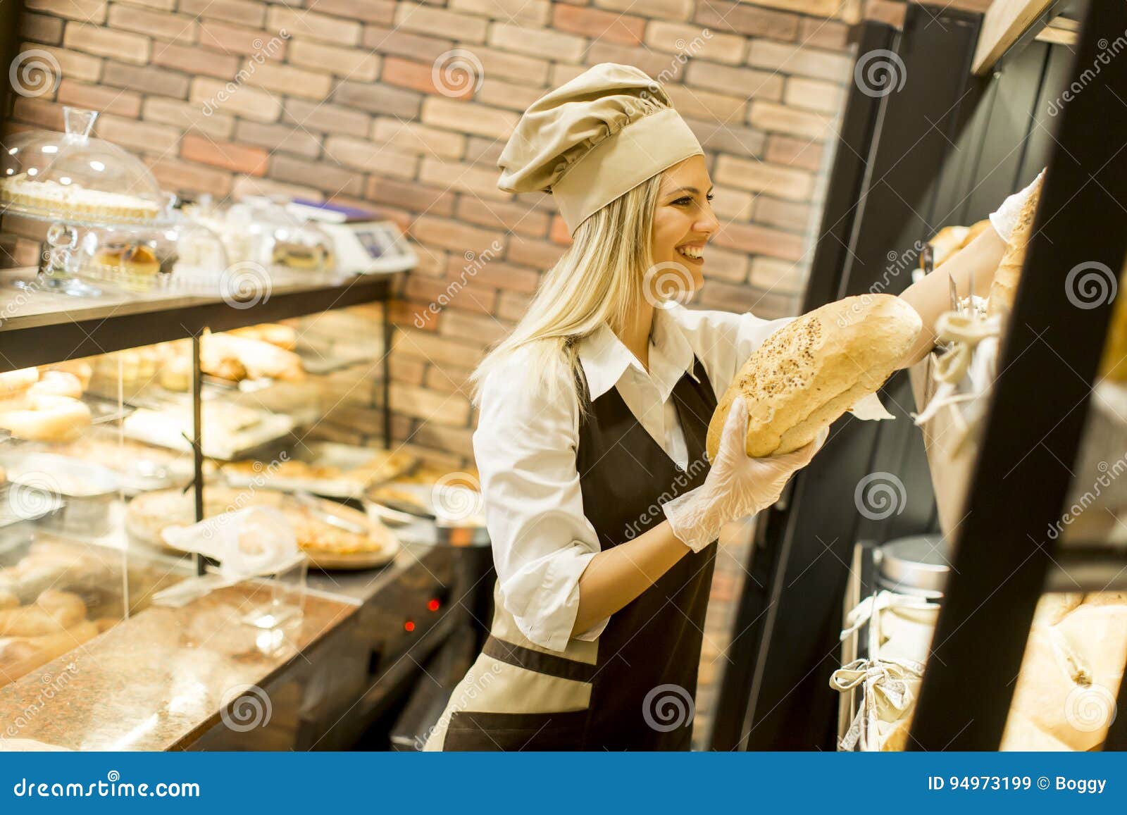 Pretty Young Woman Selling Bread in the Bakery Stock Image - Image of ...