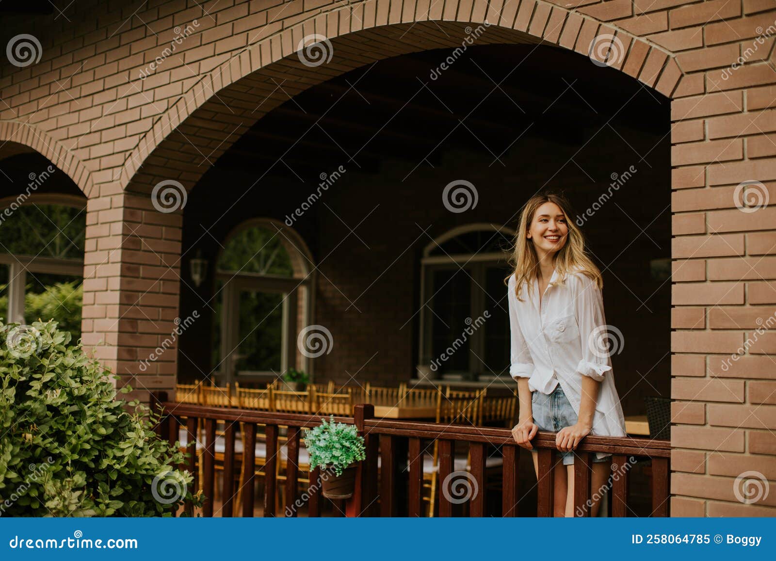 Young Woman with Standing on the Terrace Stock Image - Image of adult ...