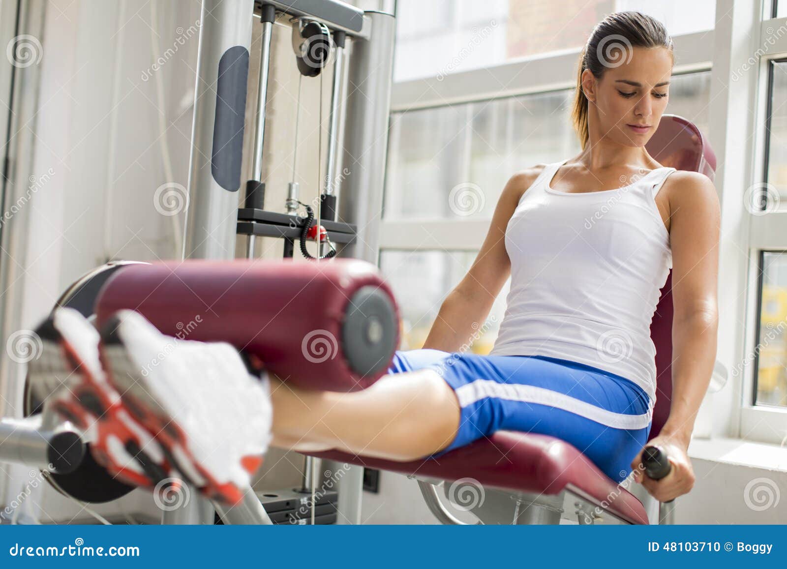 Pretty Young Woman Training in the Gym Stock Photo - Image of healthy ...