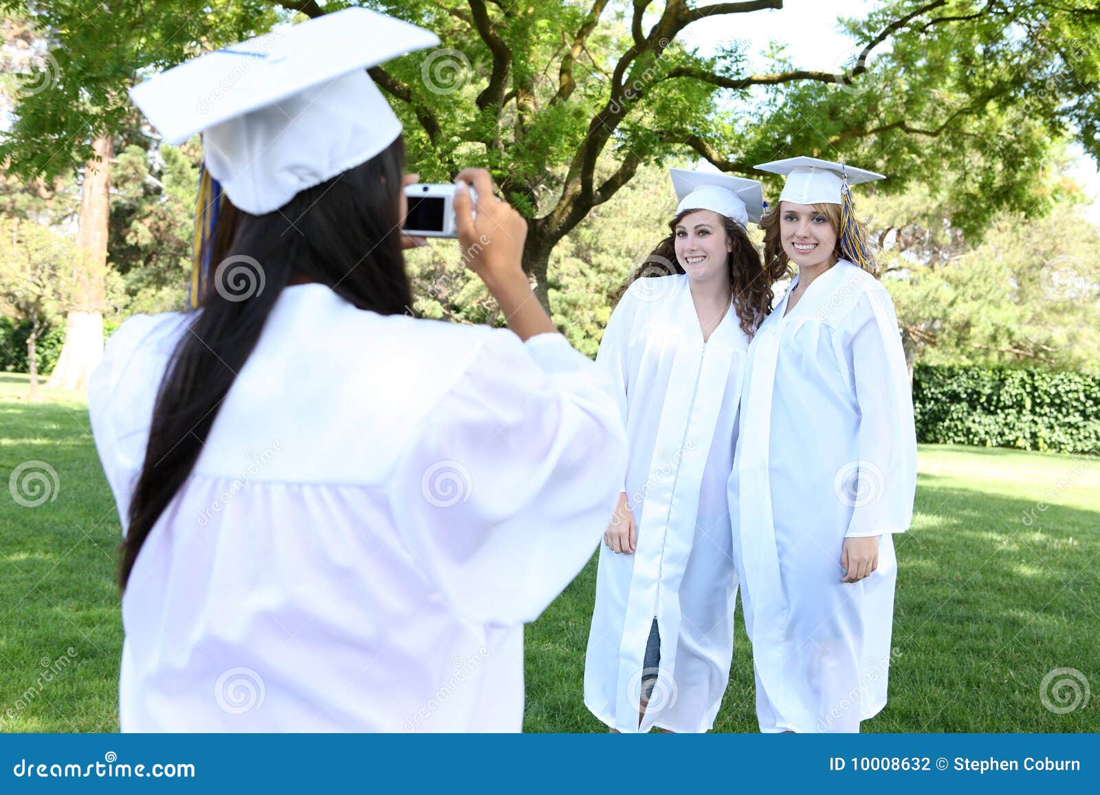 Pretty Young Women at Graduation Stock Photo - Image of embrace ...