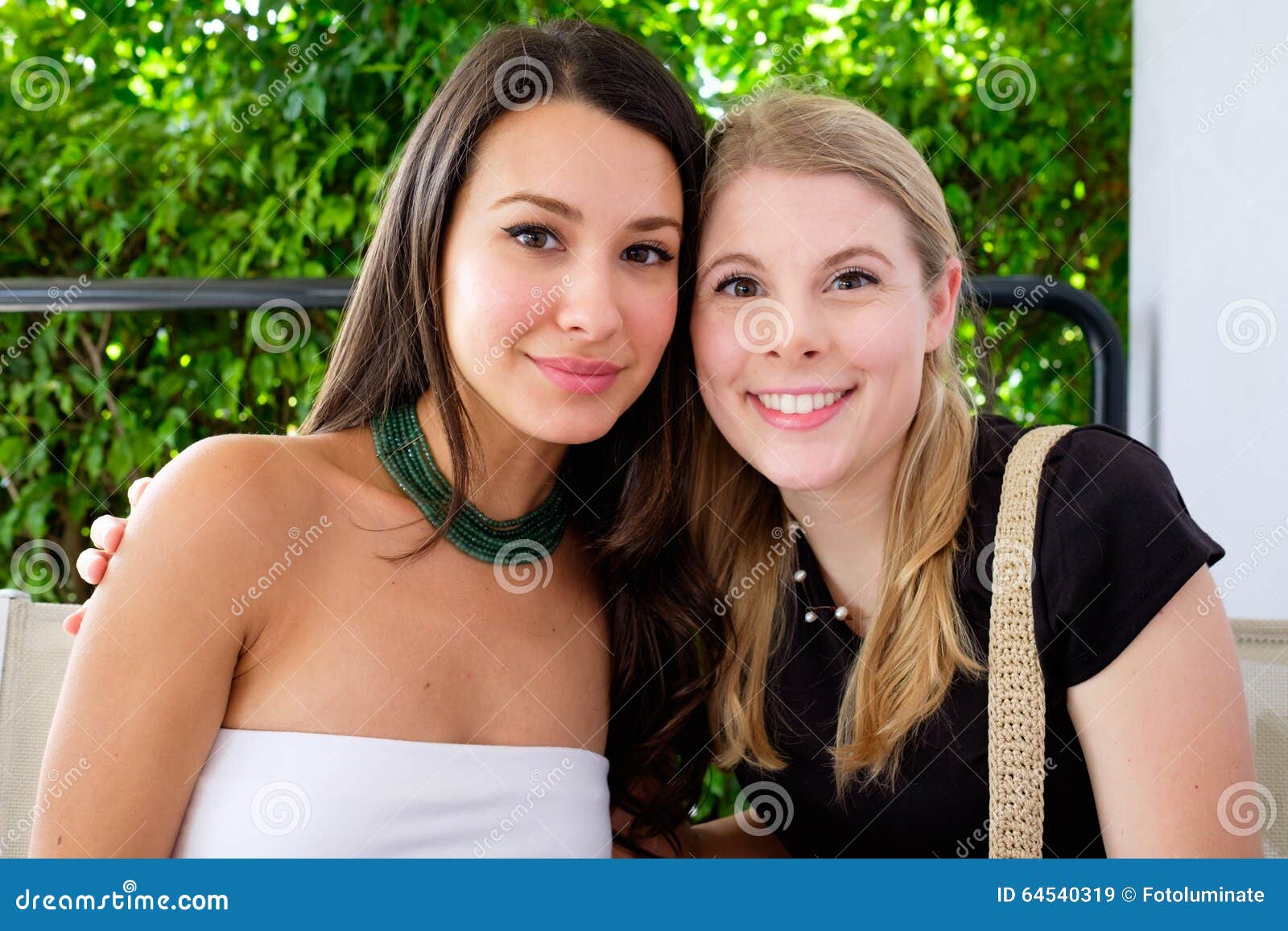 Pretty Multicultural Girls Smiling Standing On Blue Studio Background ...
