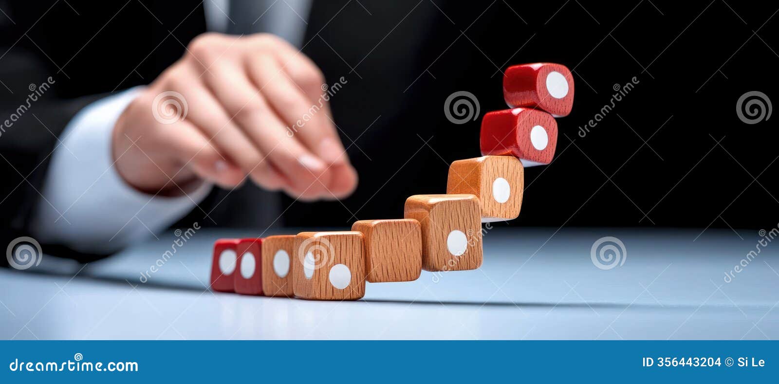 Preventing a Chain Reaction: Hand Stopping the Domino Effect for ...