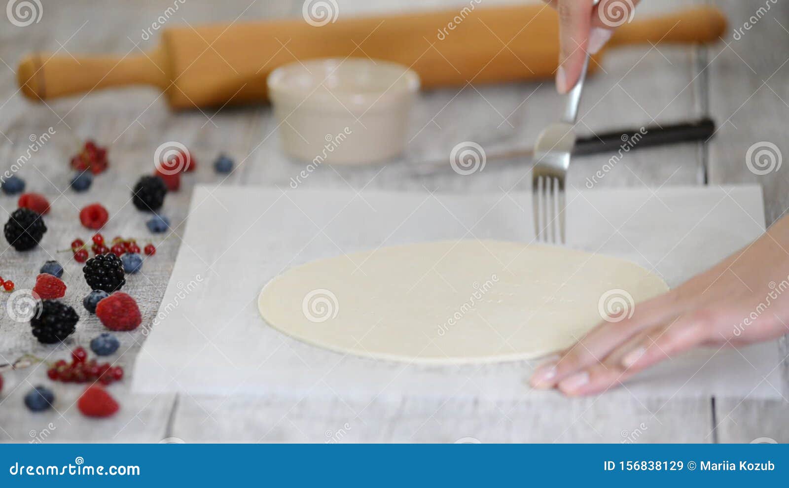 Pricking Puff Pastry Sheet with Fork. Making Puff Pastry Cake Stock ...