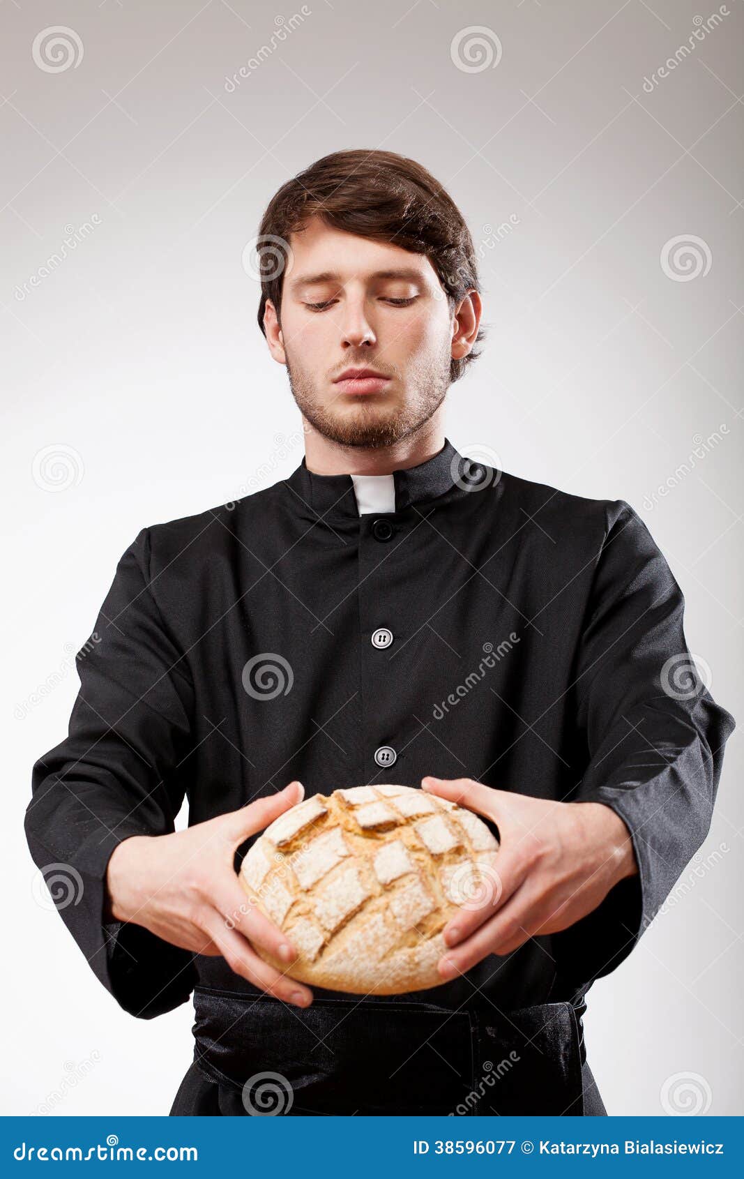 Priest with bread stock image. Image of clerical, catholicism - 38596077