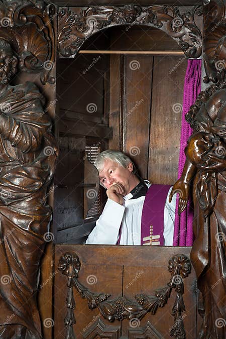 Priest in confession booth stock photo. Image of church - 28892810