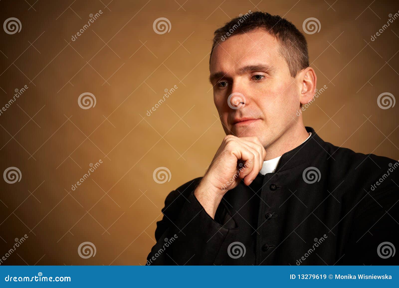 Priest with Hand Under Chin Stock Image - Image of prayer, coat: 13279619