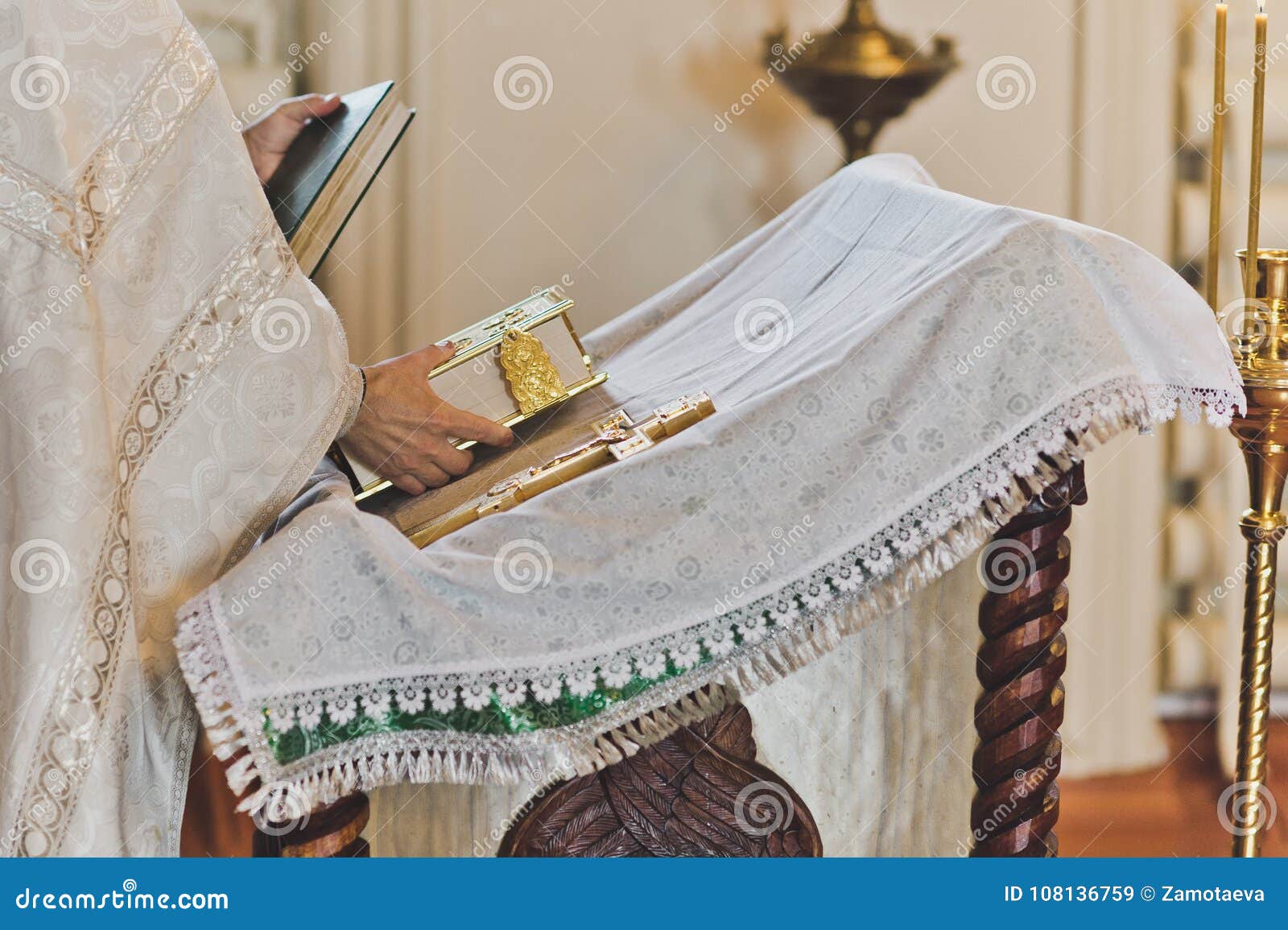 The Book is in the Hands of the Priest 6514. Stock Image - Image of ...