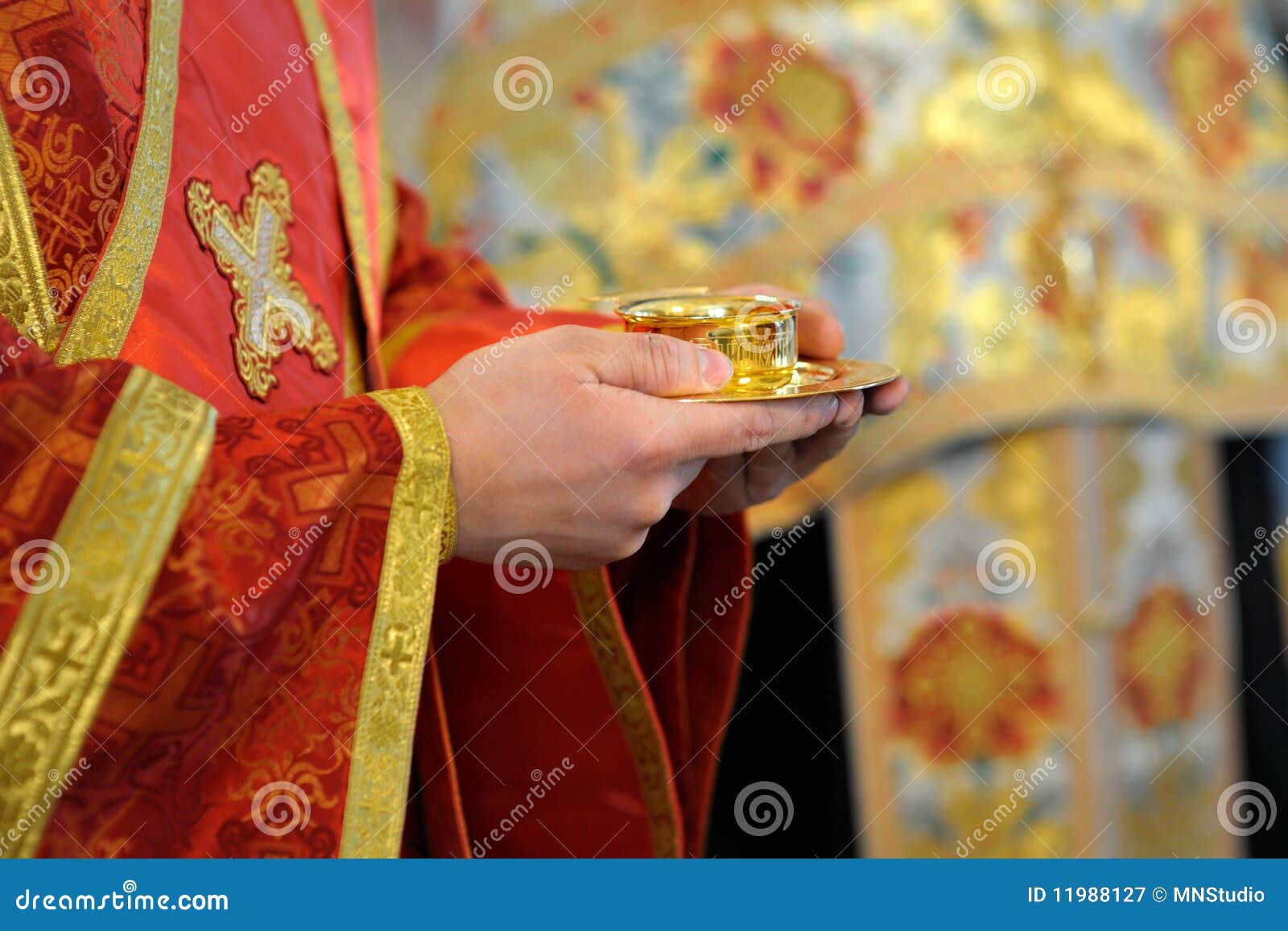 Priest Holding Bread and Wine Stock Image - Image of priest, ceremony ...
